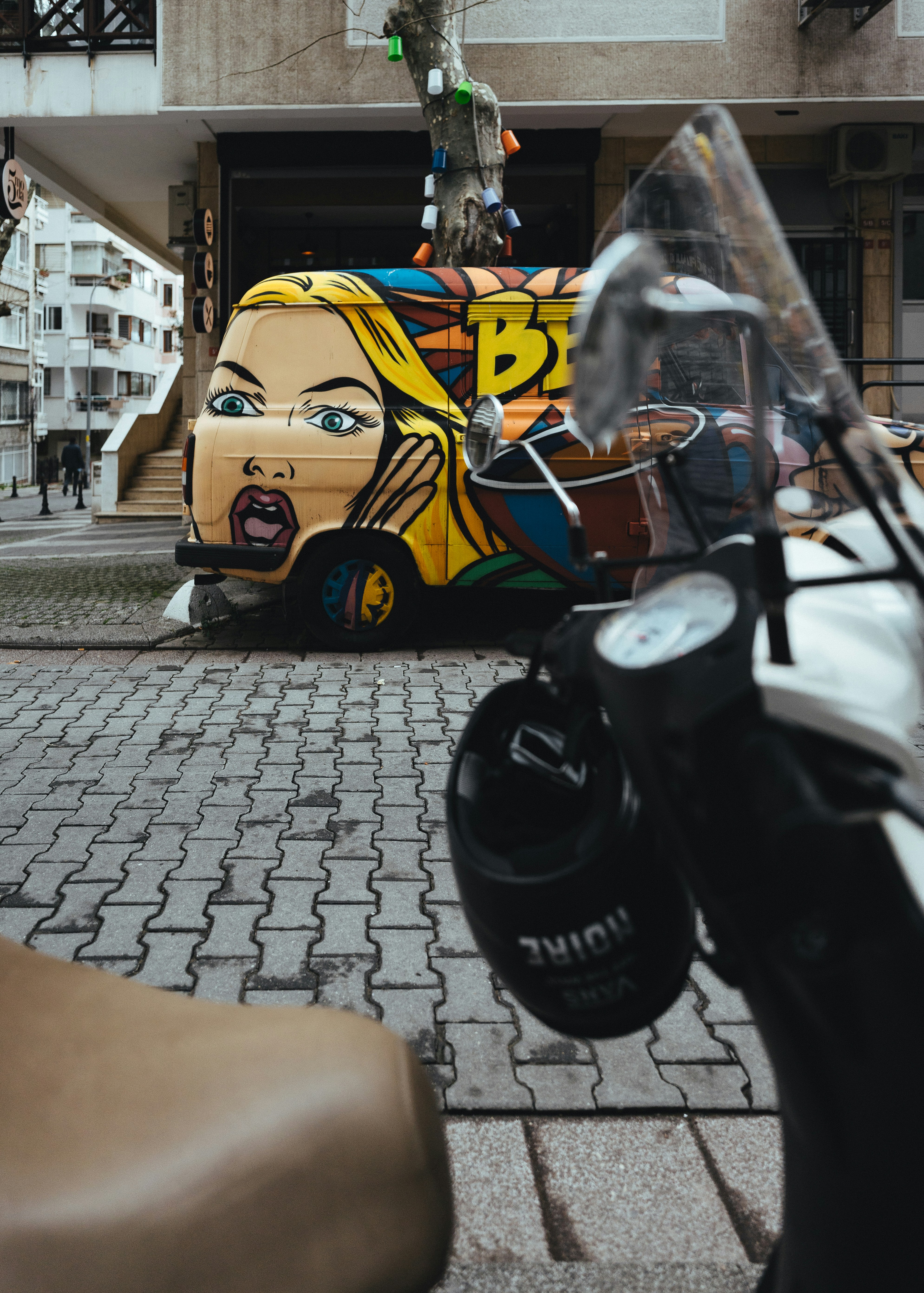 Graffiti Van Portrait: A Pop Art Scene by the Street
