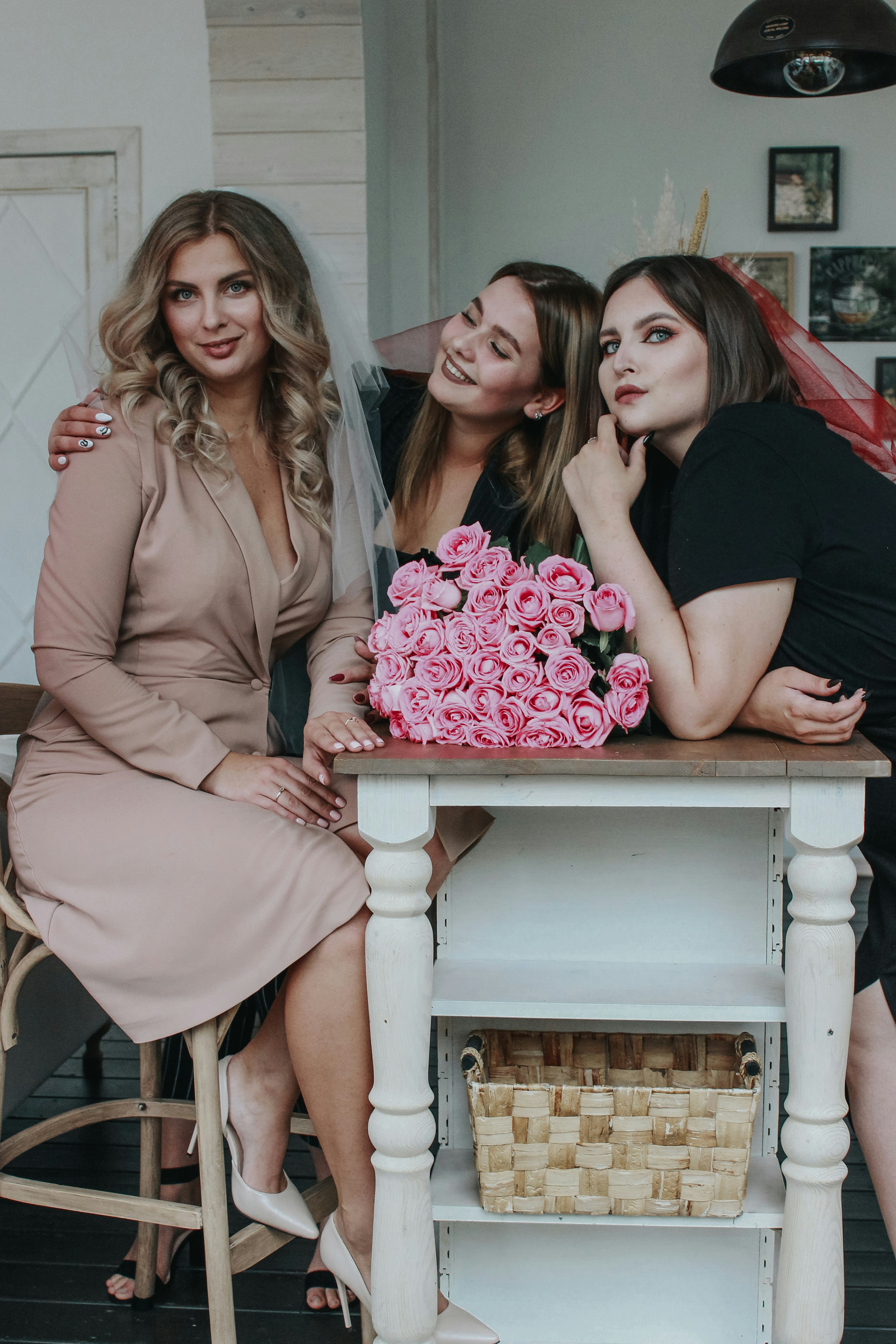 3 women sitting on chair smiling photo – Free Happy Image on Unsplash