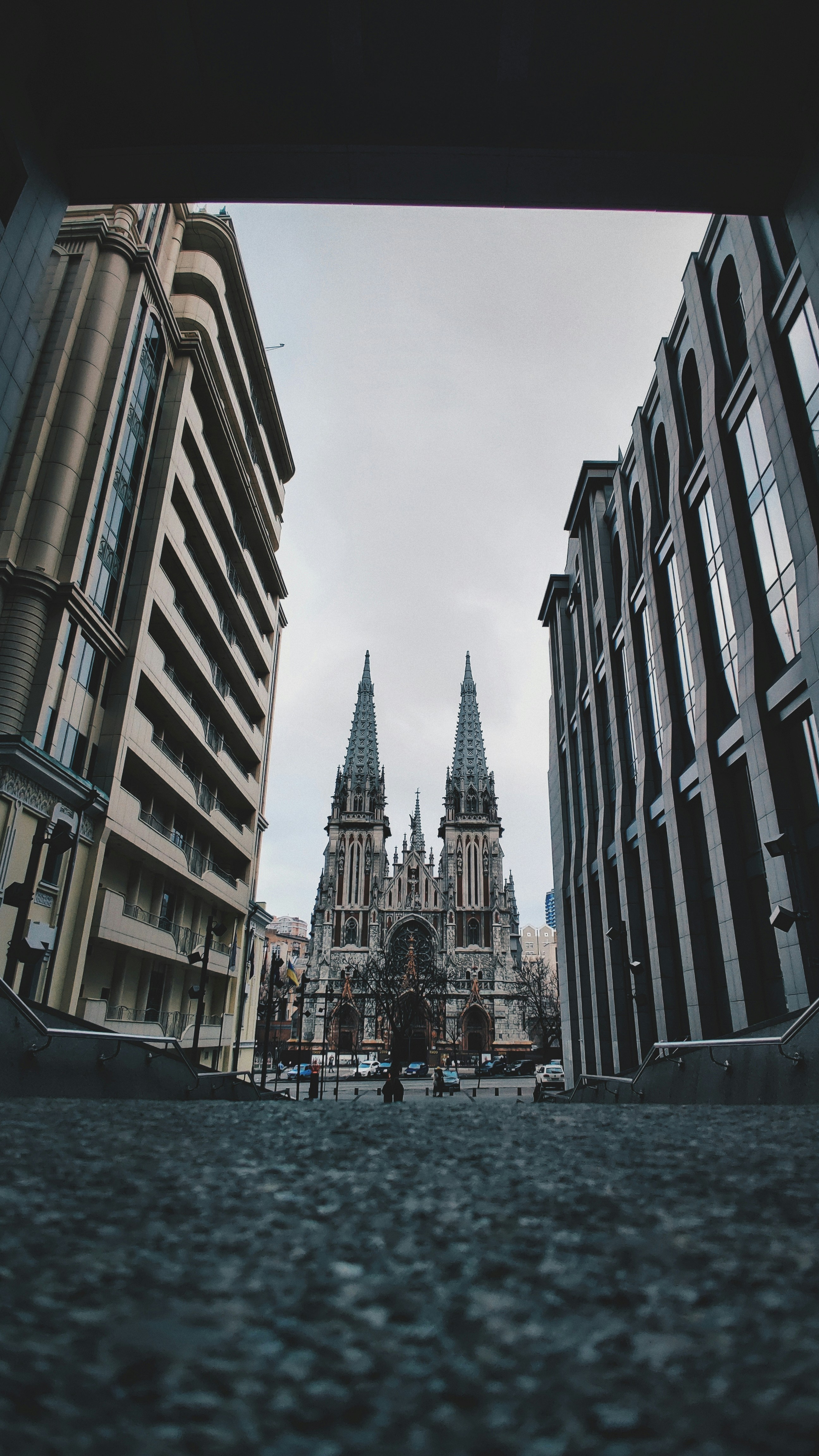 Between Urban Giants: Cathedral Spires Framed by a City Corridor