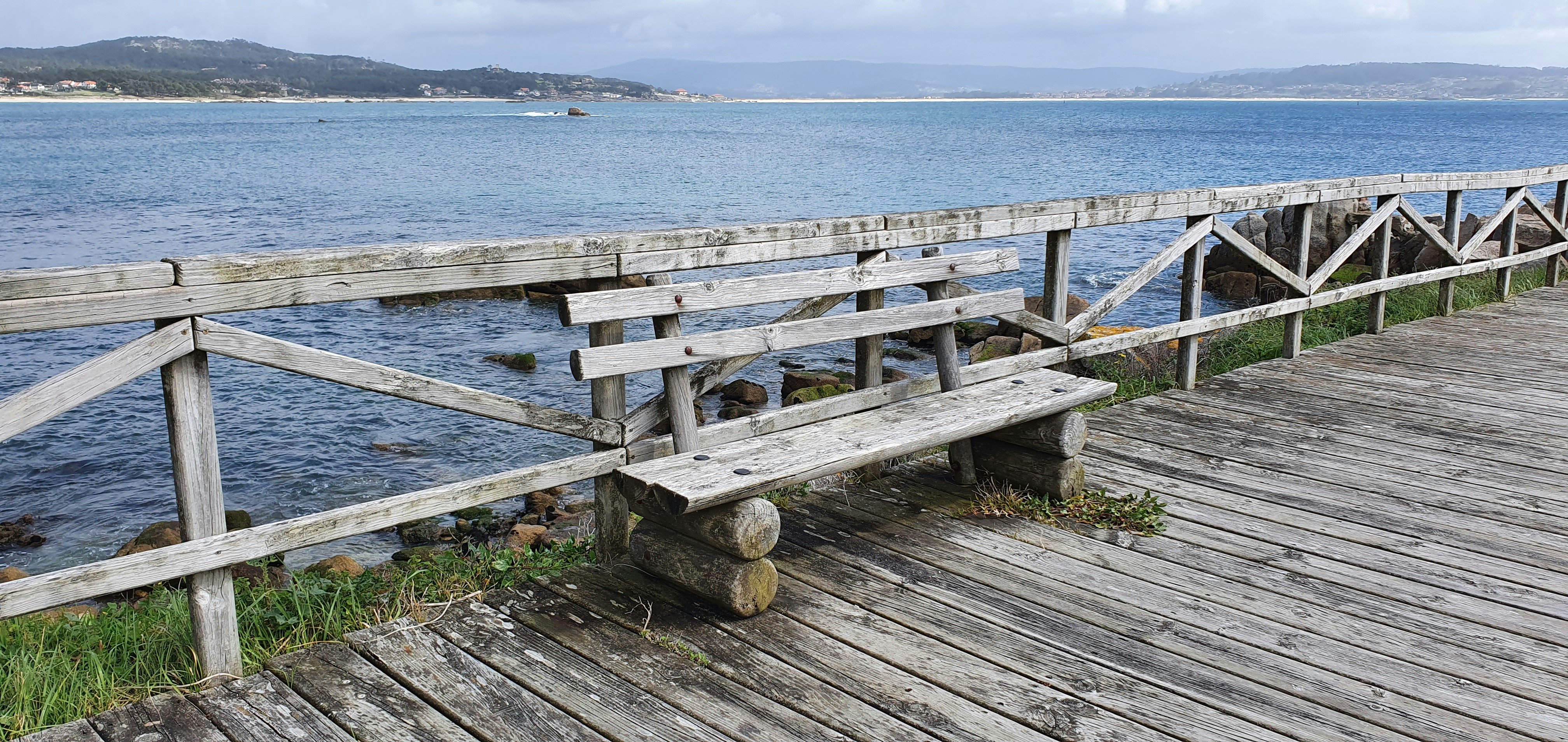 Brown wooden sea dock during daytime photo – Free España Image on Unsplash