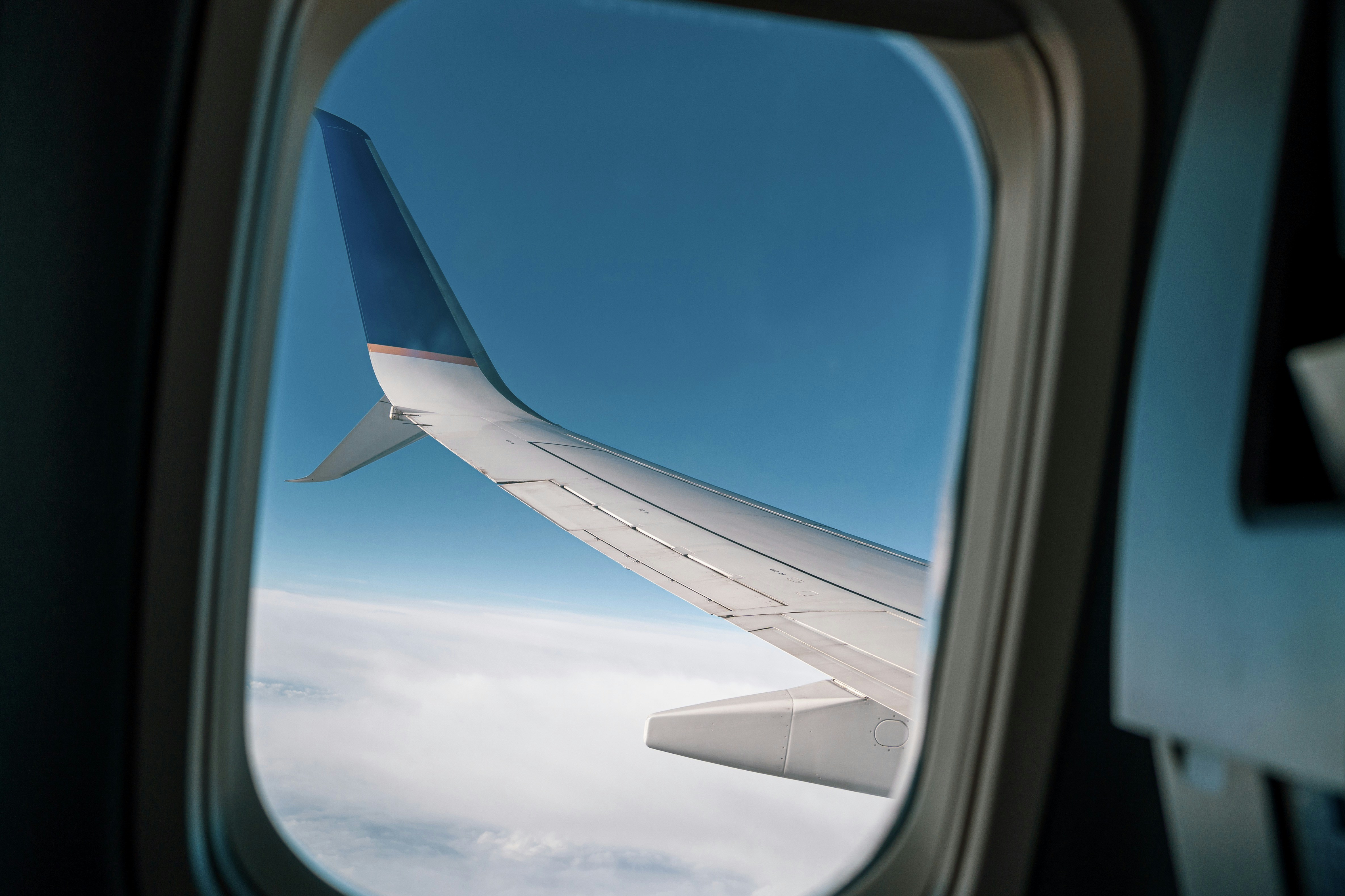 White and blue airplane wing photo – Free Blue Image on Unsplash