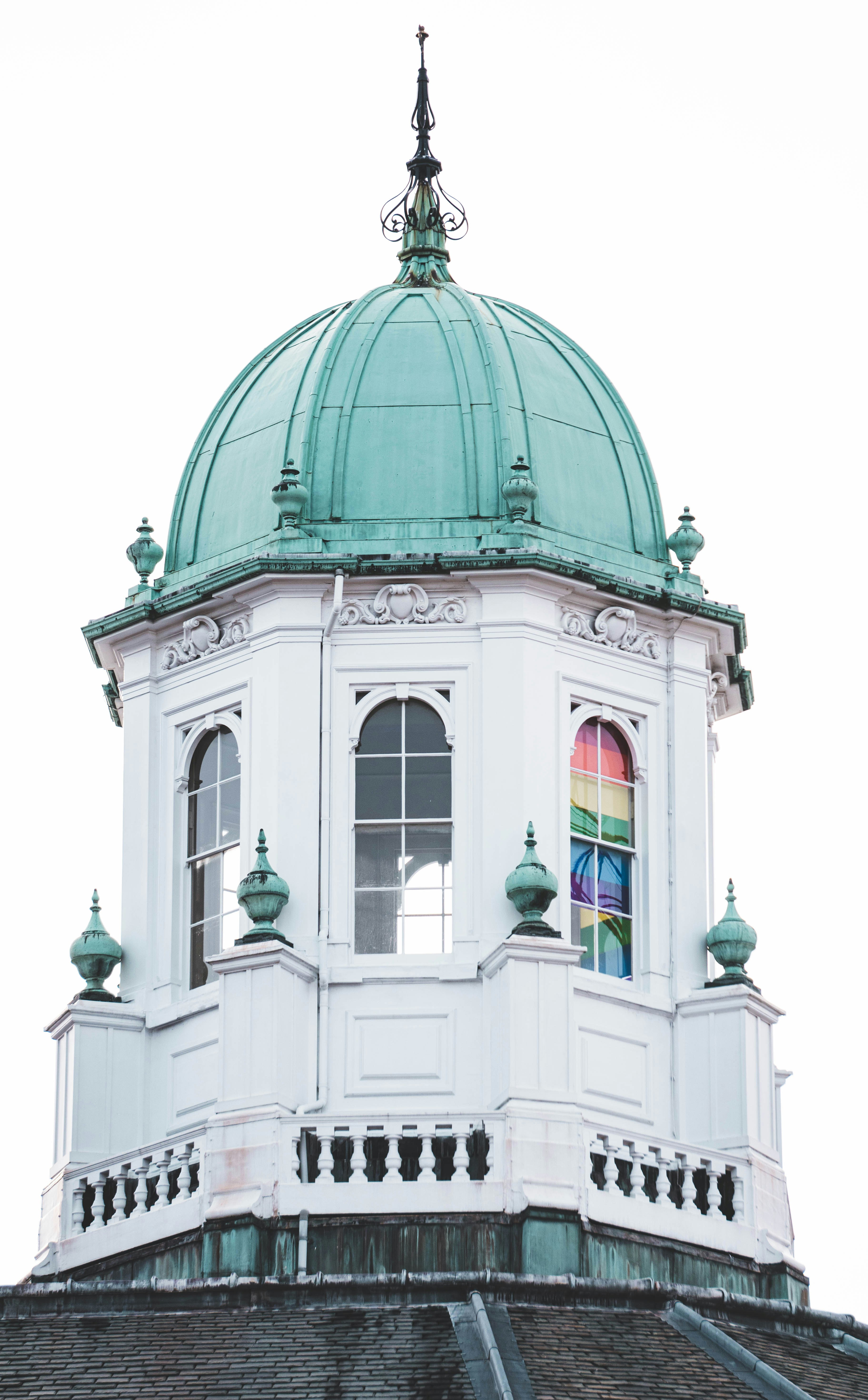 Verdigris Cupola Crowned on a White Turret