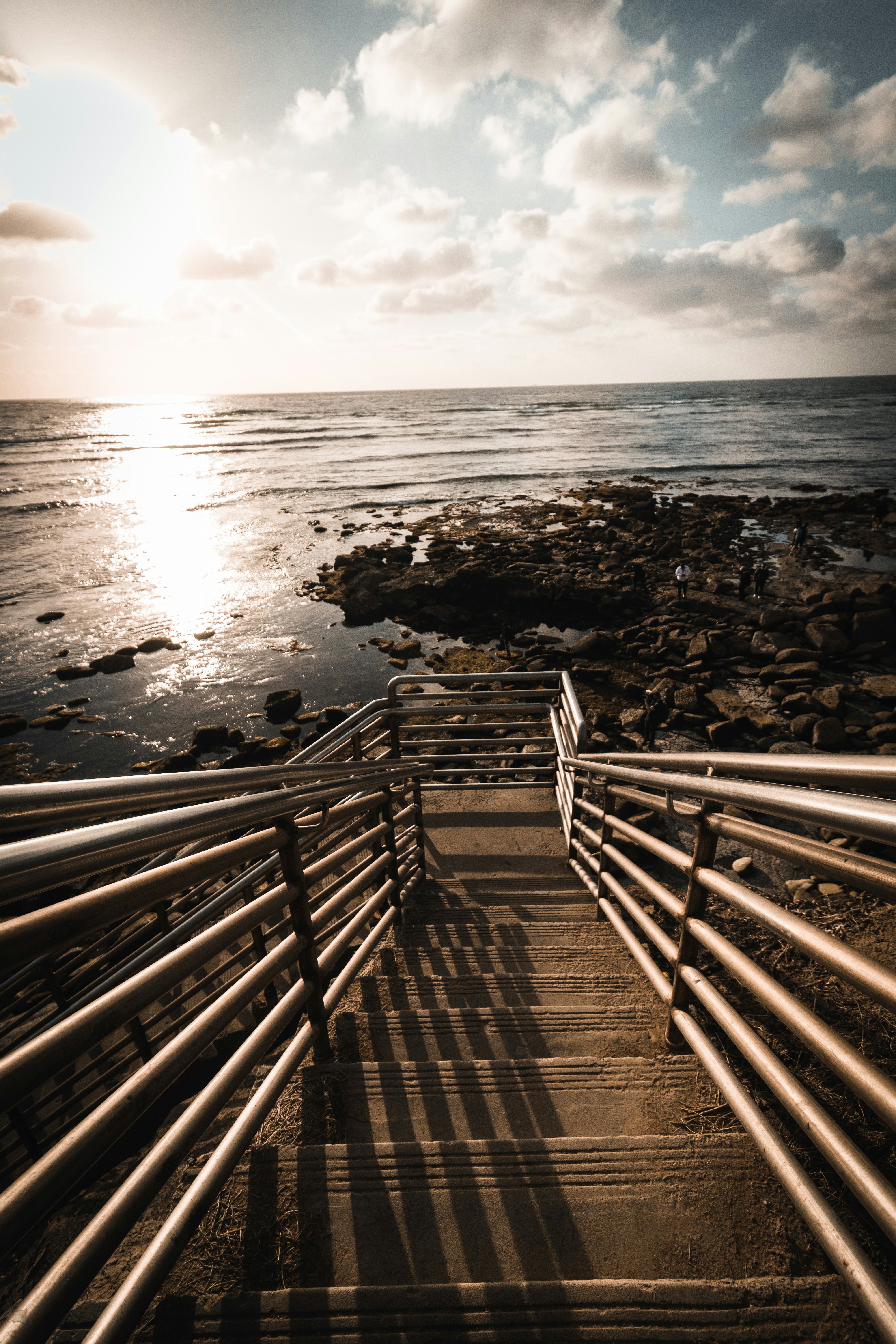 Steel Rails to the Horizon: Steps Down Toward the Sea