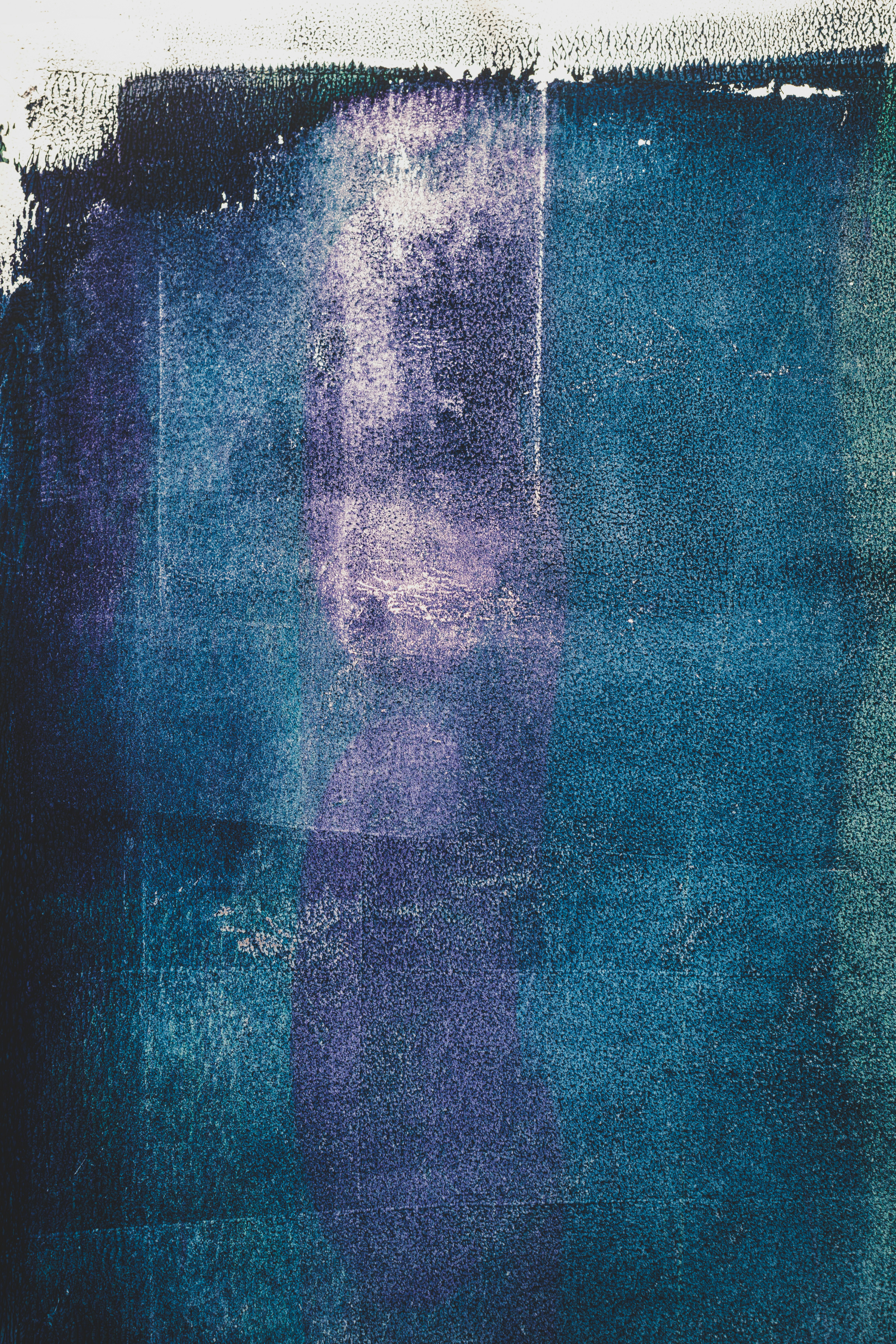 A textured abstract composition featuring deep blues and purples, evoking a sense of tranquility and depth.