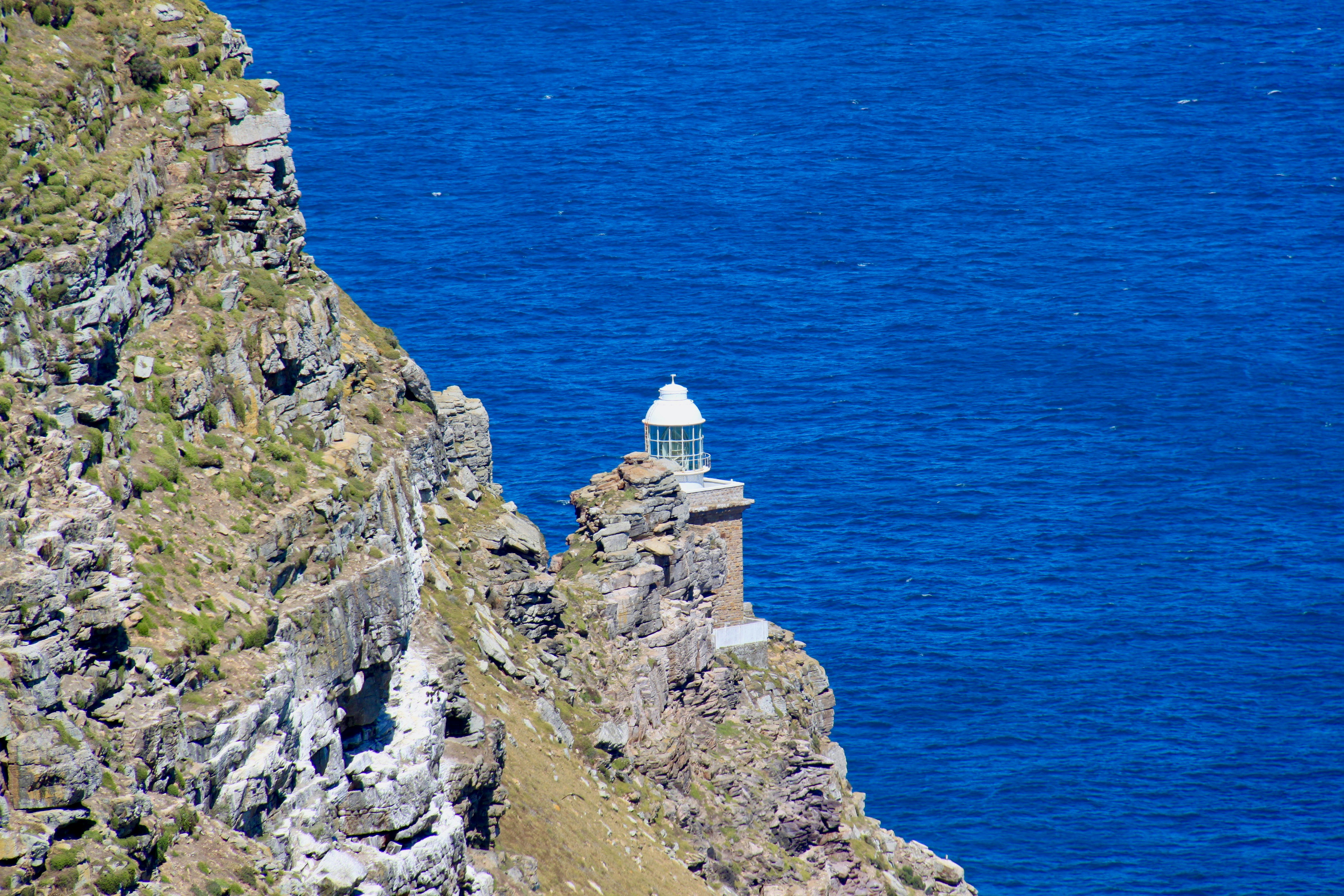 Lighthouse Standout on Sea Cliff