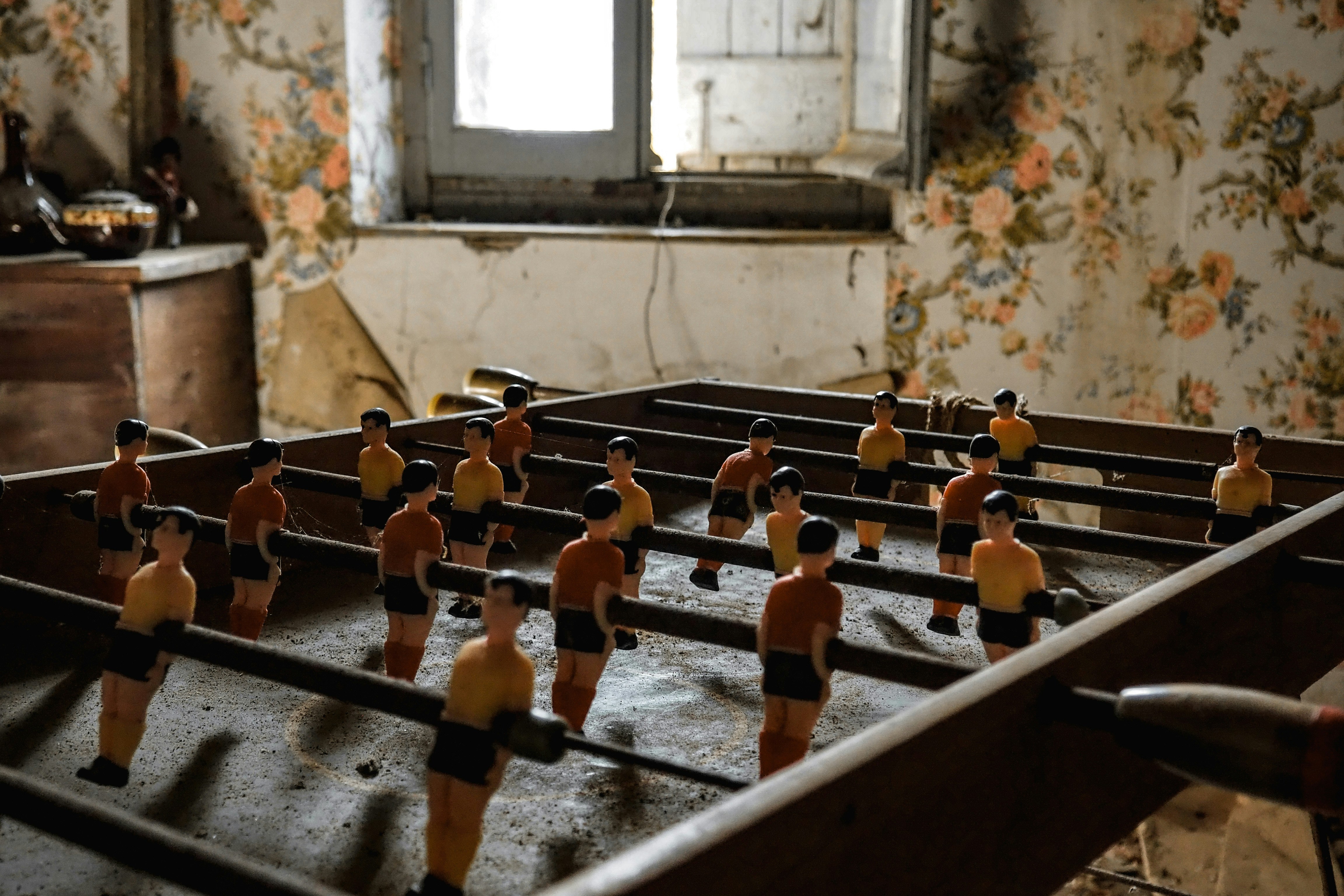 Whispered Strikes on a Weathered Foosball Table