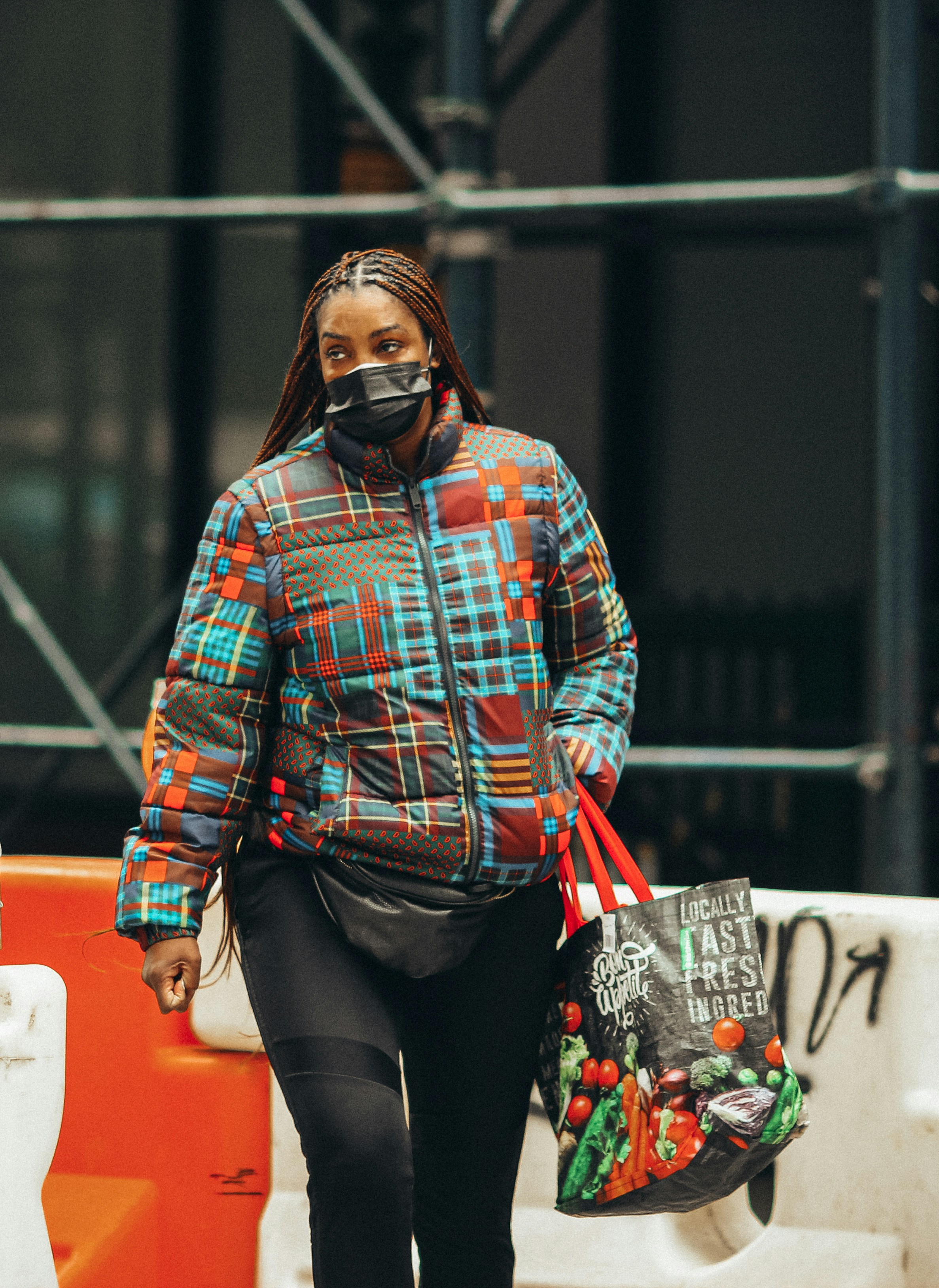 Patchwork on the Move: A Masked Shopper Traverses a City Block