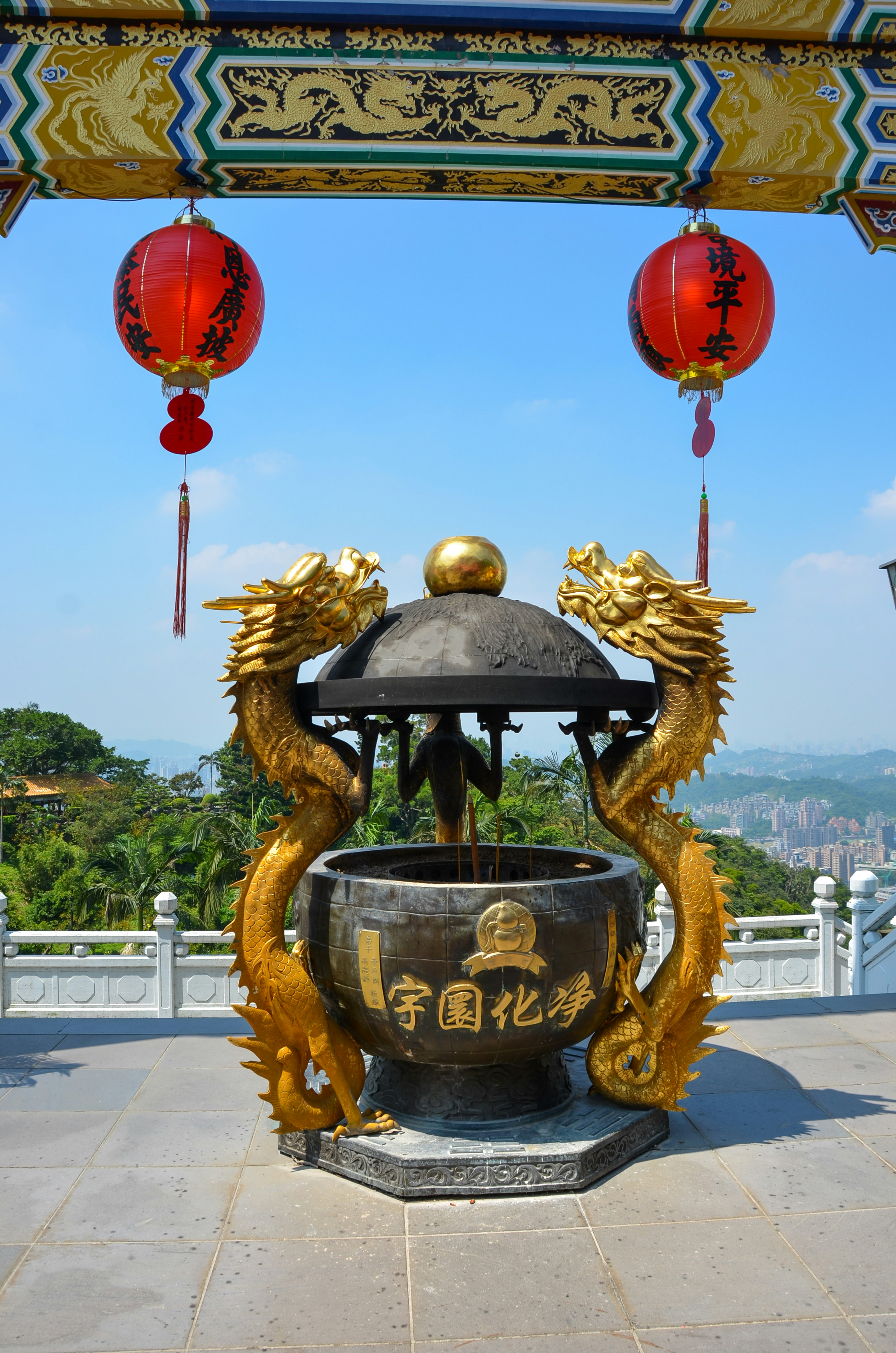 red and gold round bell with gold and black round bell