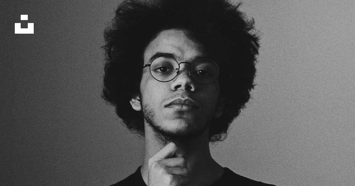 Man In Black Crew Neck Shirt Wearing Black Framed Eyeglasses Photo