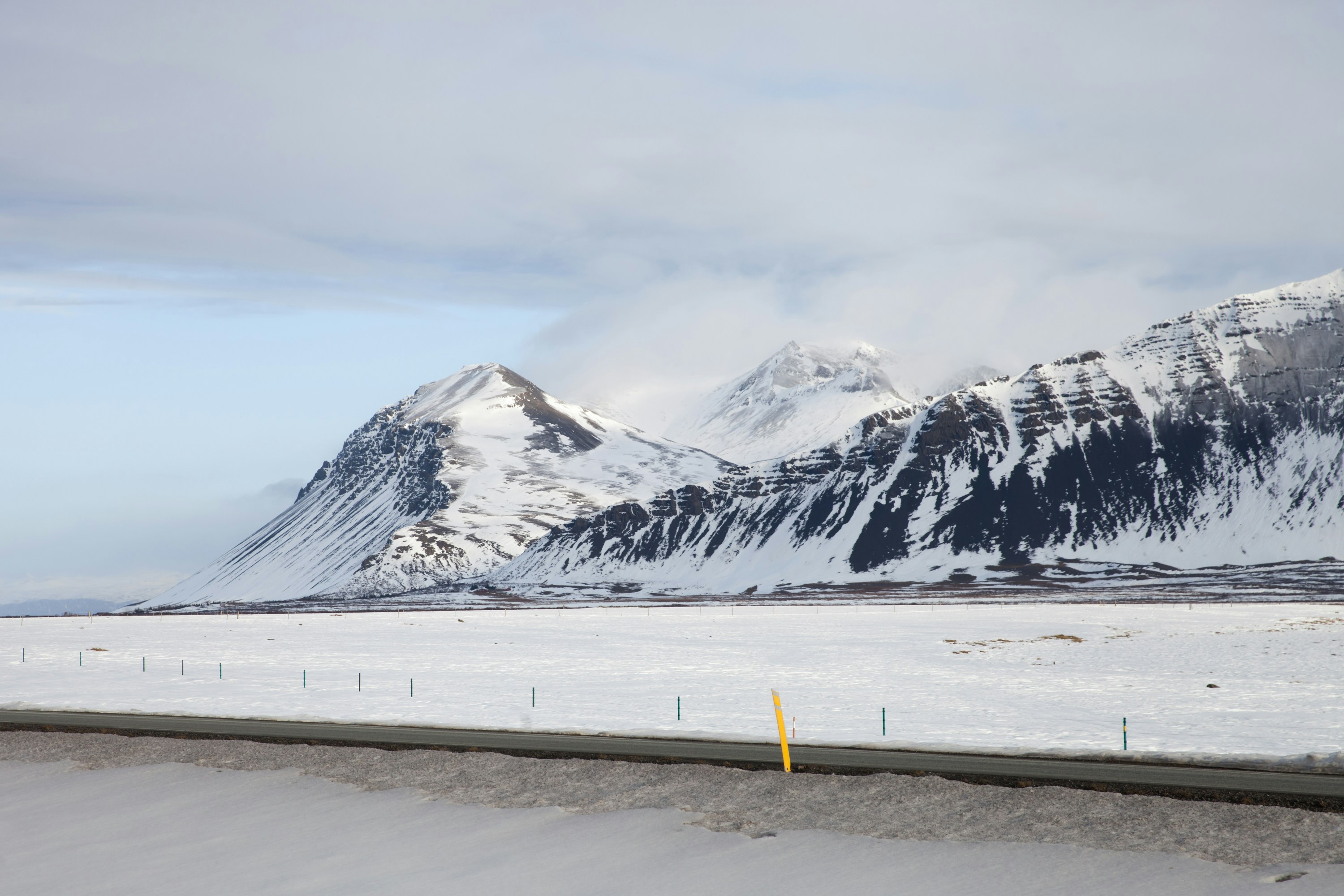 Snowbound Ridge under a Lenticular Sky