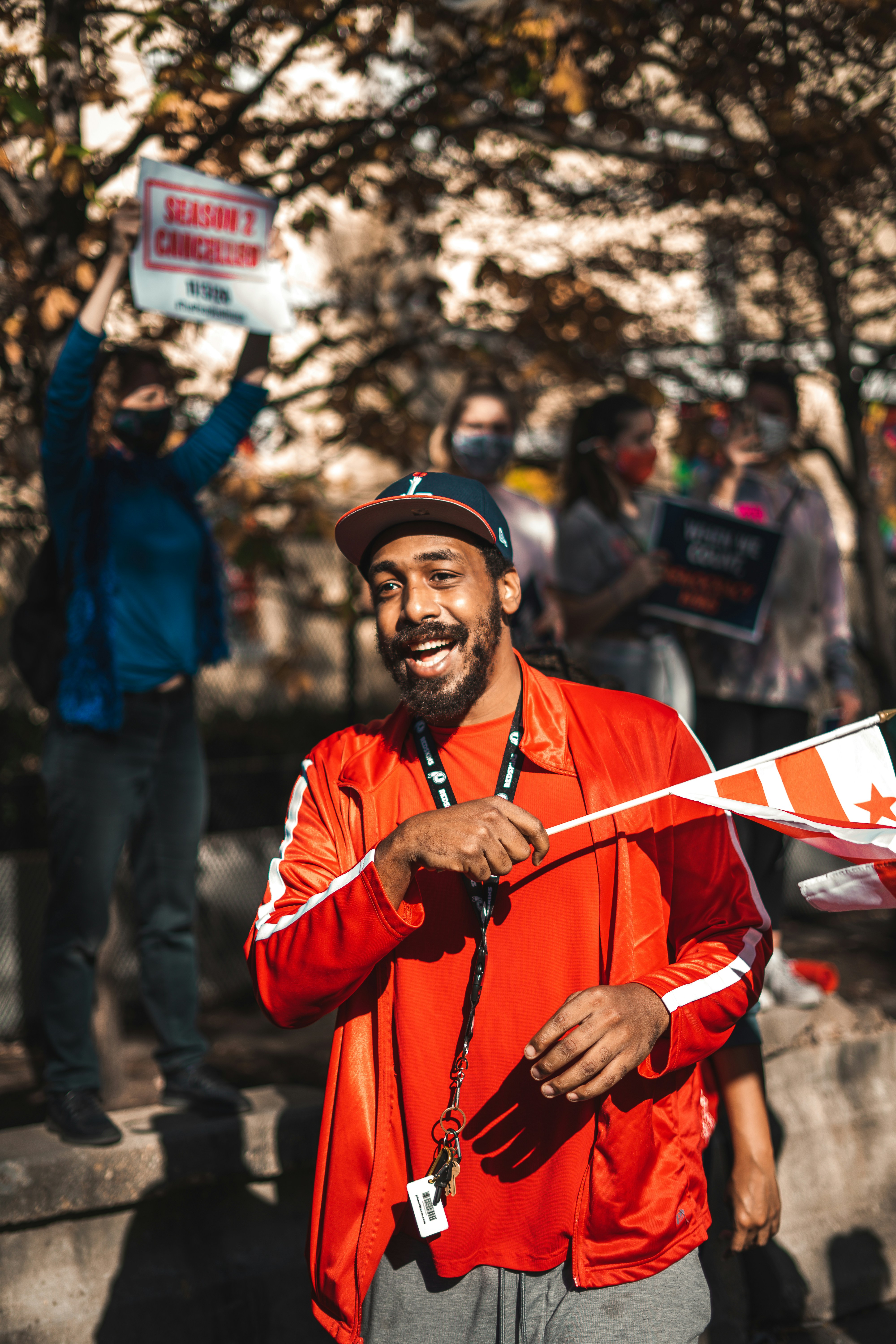 Front-and-Center in Orange: A Joyful Moment at the Protest Rally