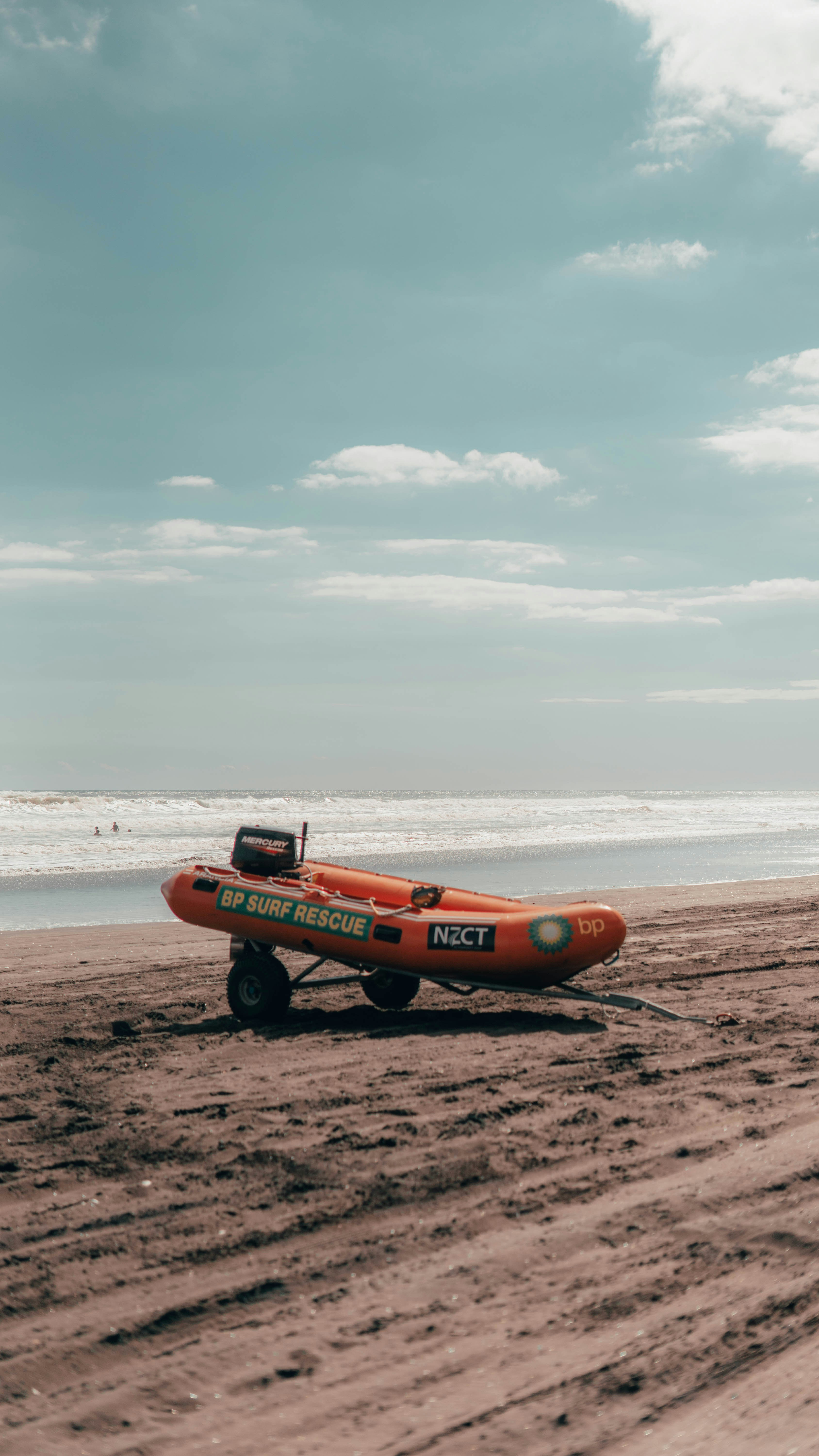 Red and black kayak on beach during daytime photo – Free Karioitahi ...