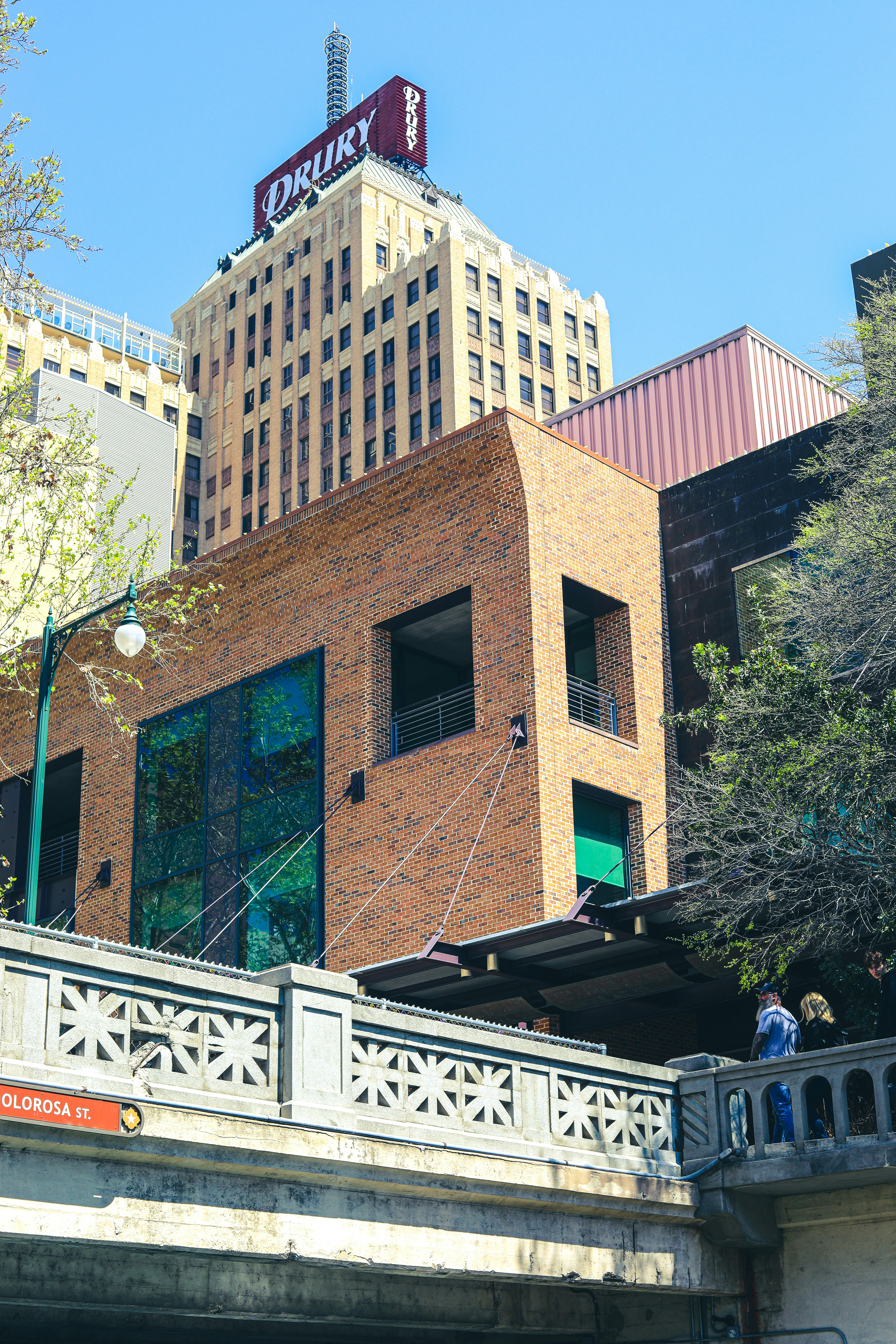 Urban Brick Facade Under a Bright Blue Sky