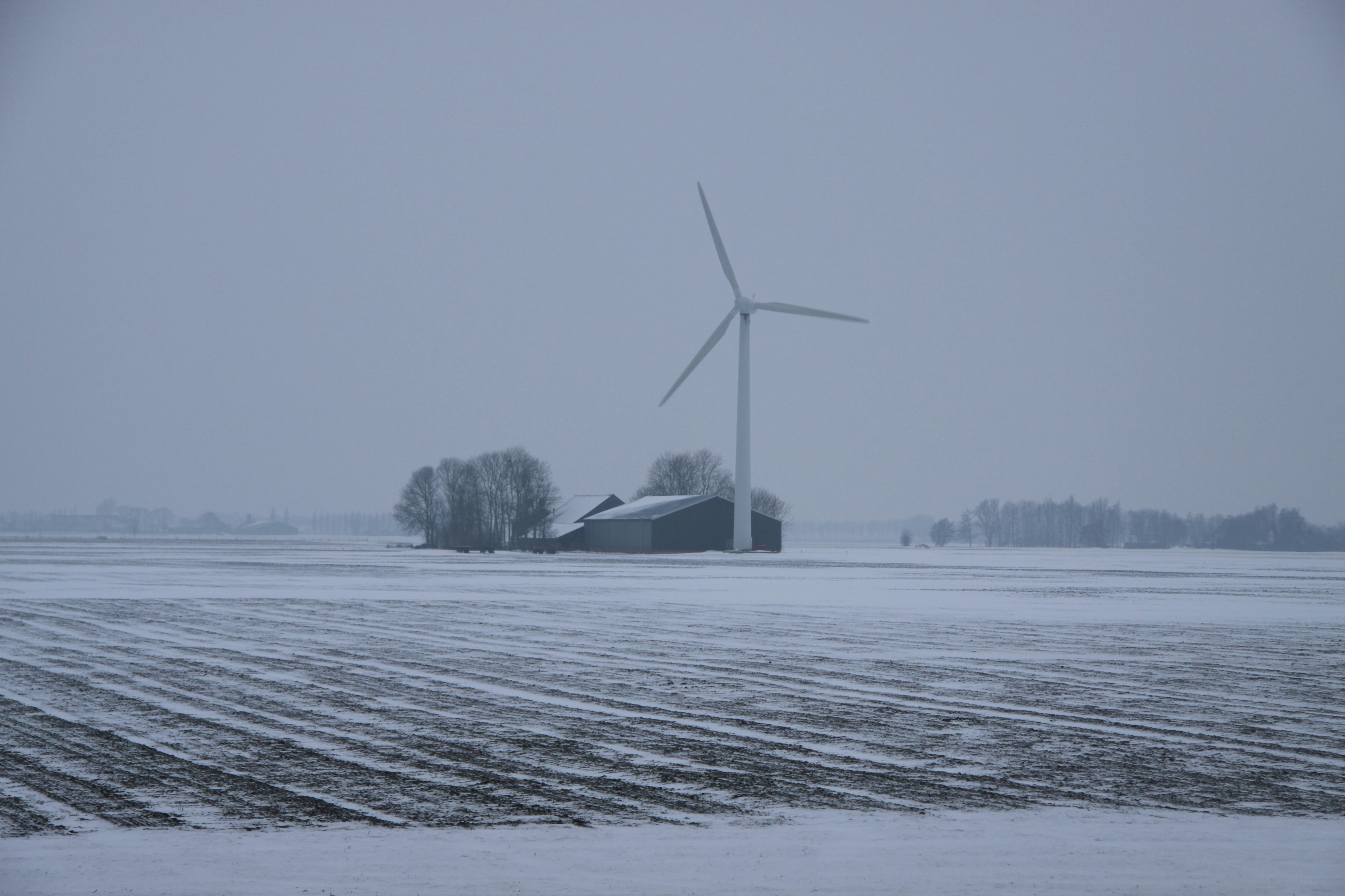 Wind mill on snow covered ground during daytime photo – Free Grey Image ...