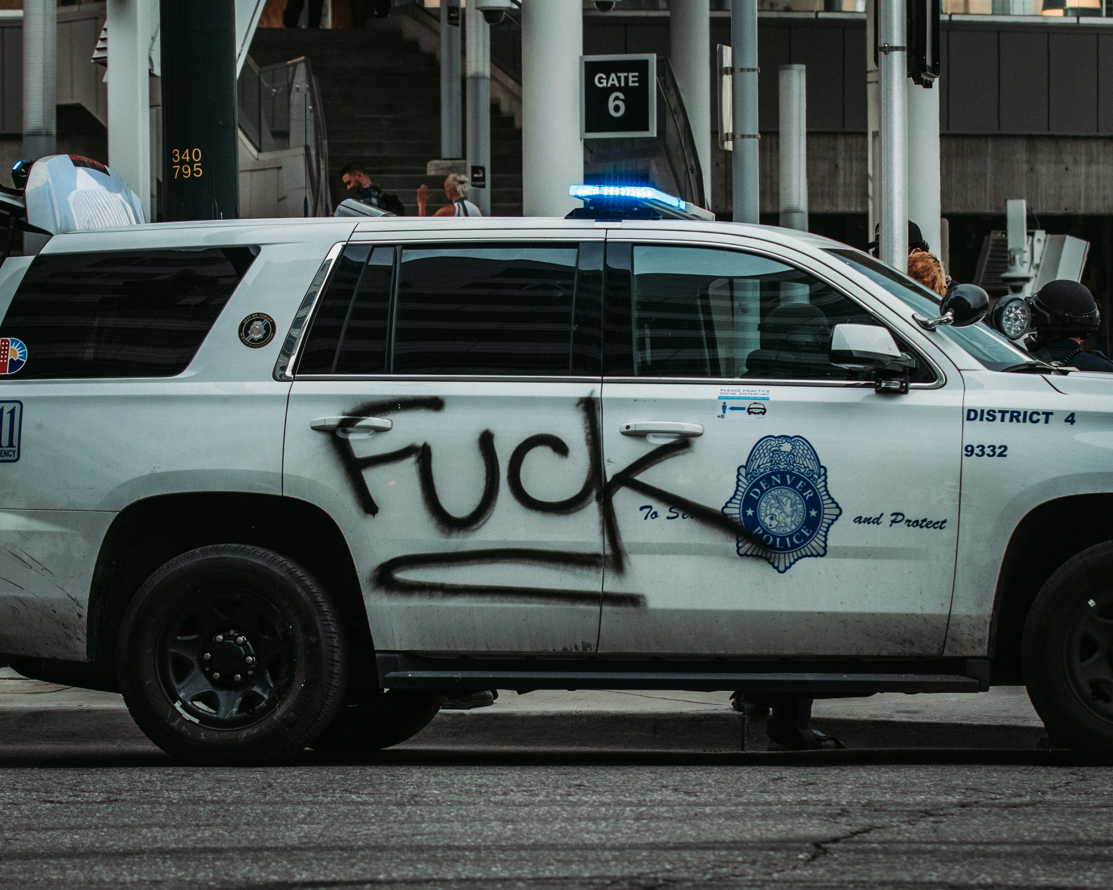 Tag on Patrol: Graffiti Across a District Police SUV by Gate 6