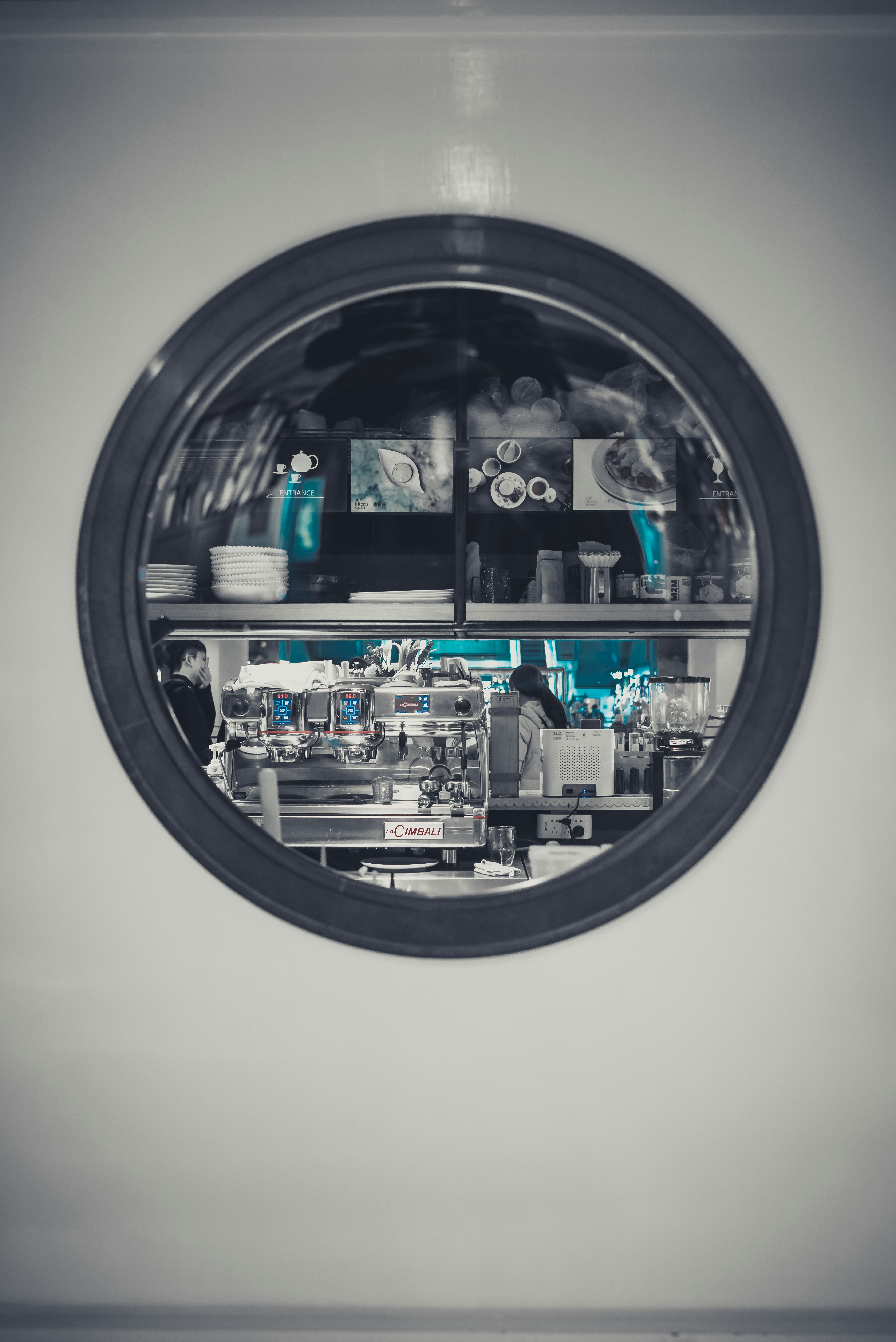 round white wooden framed glass window