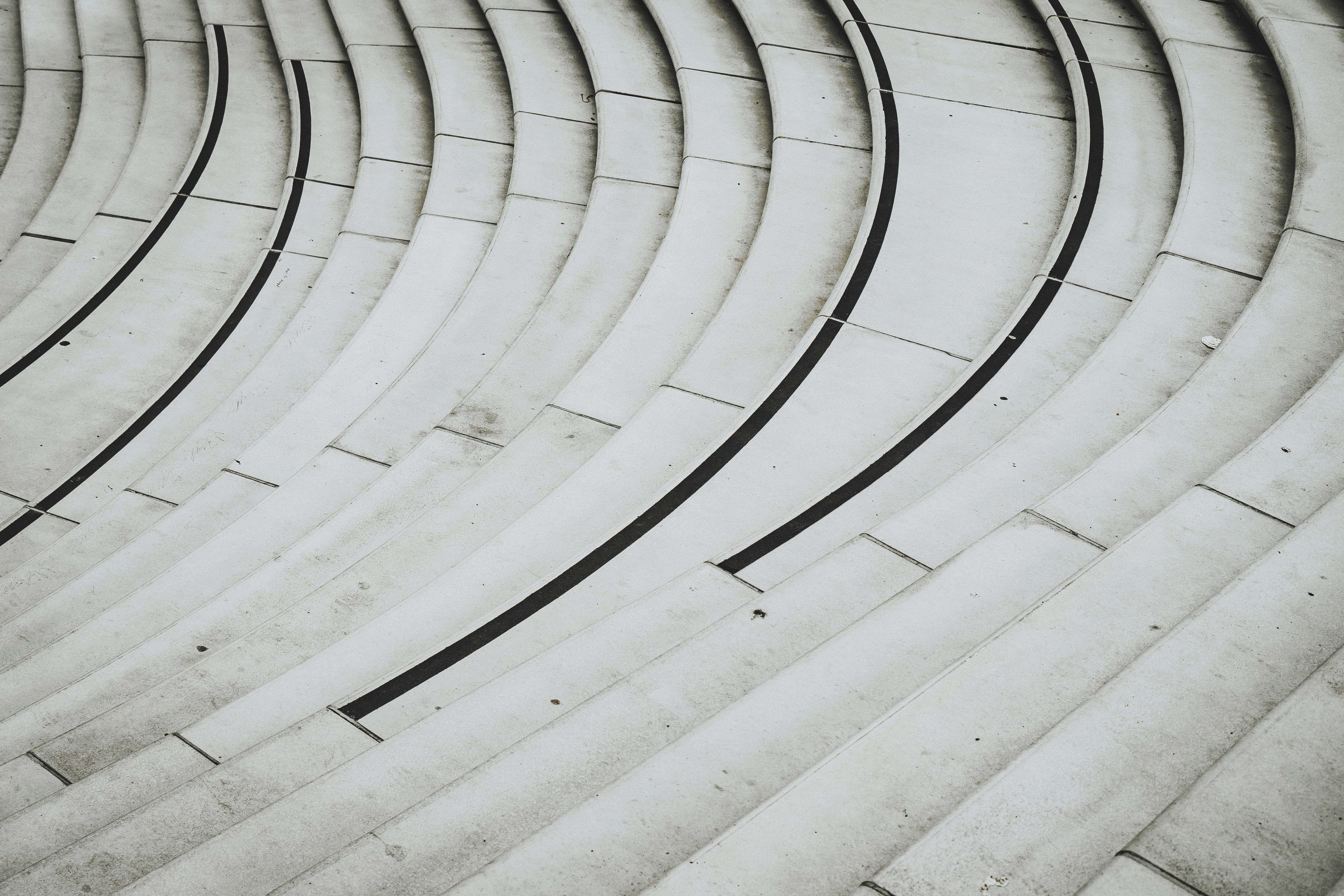 Rhythms in Stone: Spiral Concrete Steps in Monochrome