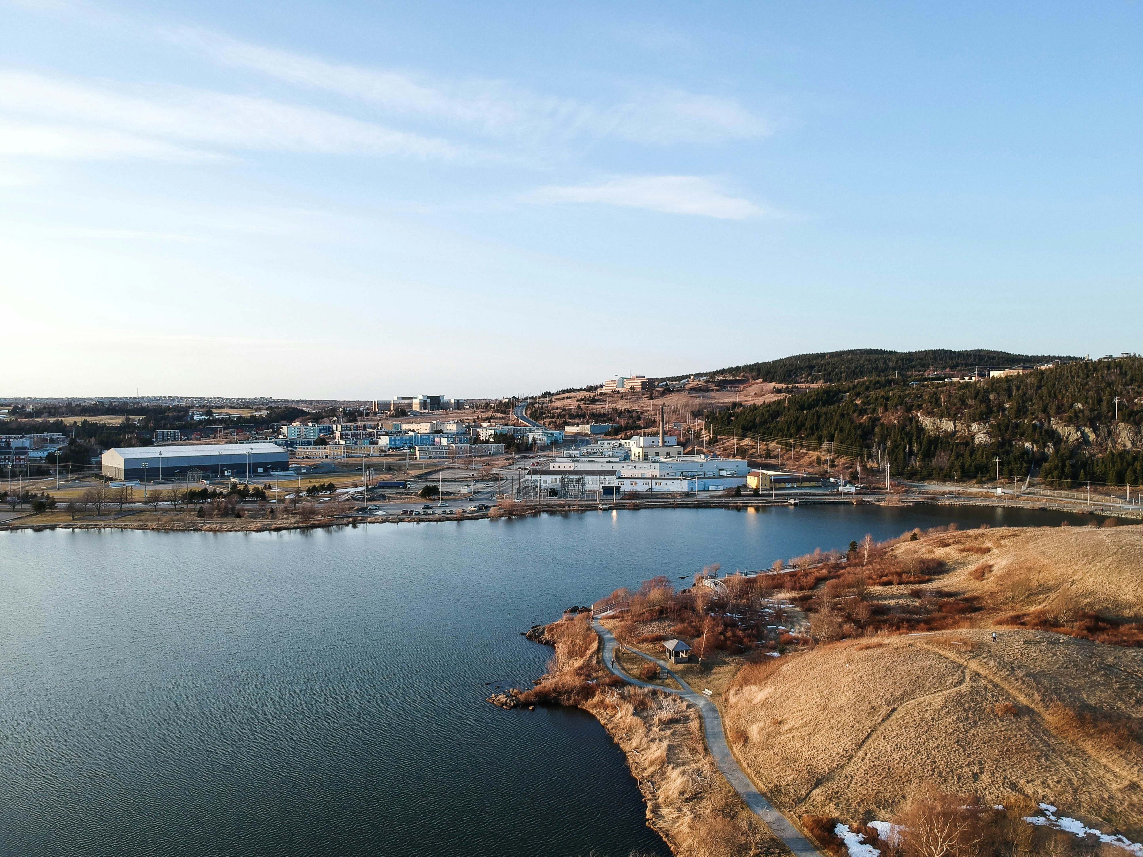 Body of water near city buildings during daytime photo – Free ...