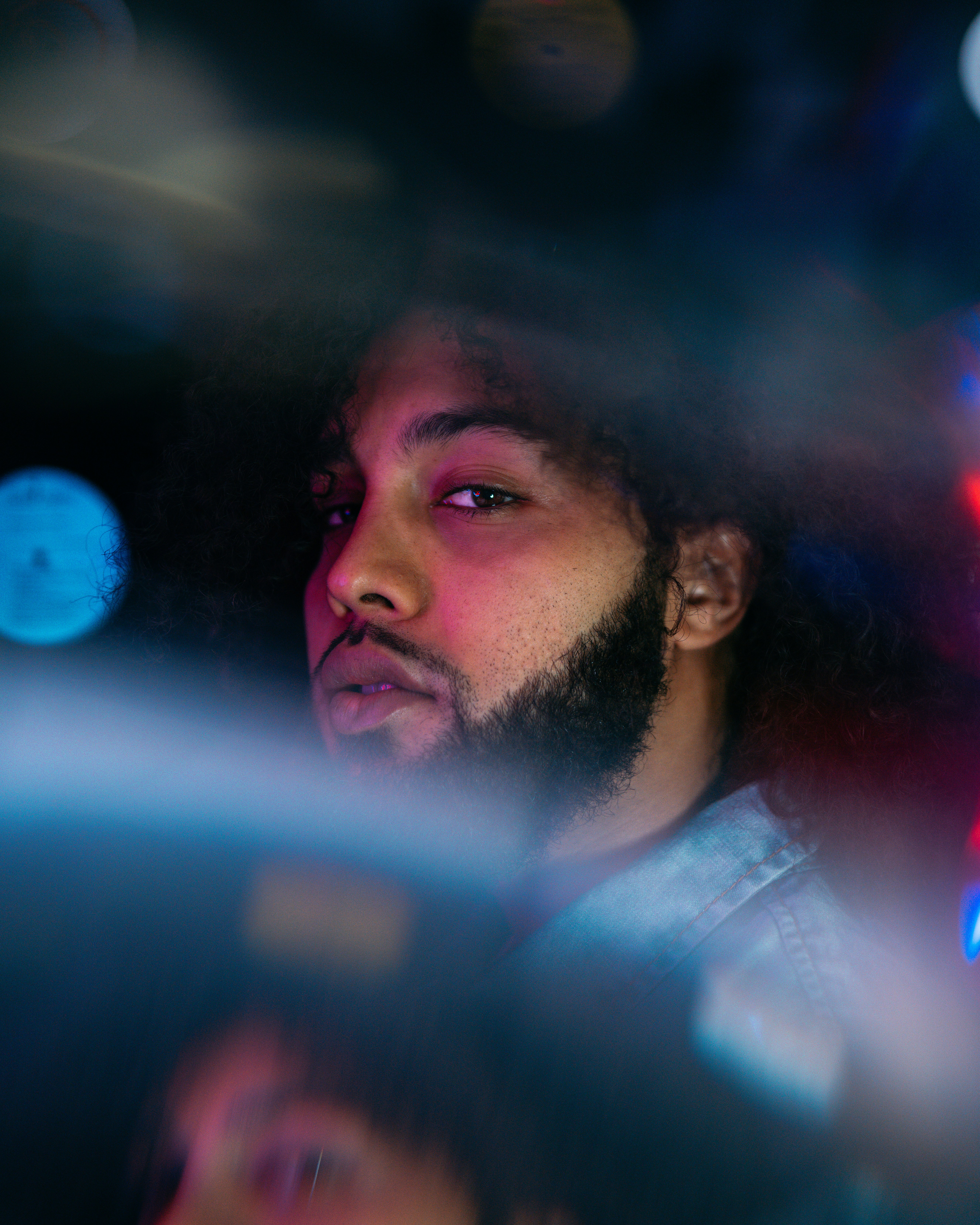 Neon Portrait through a Velvet Blur