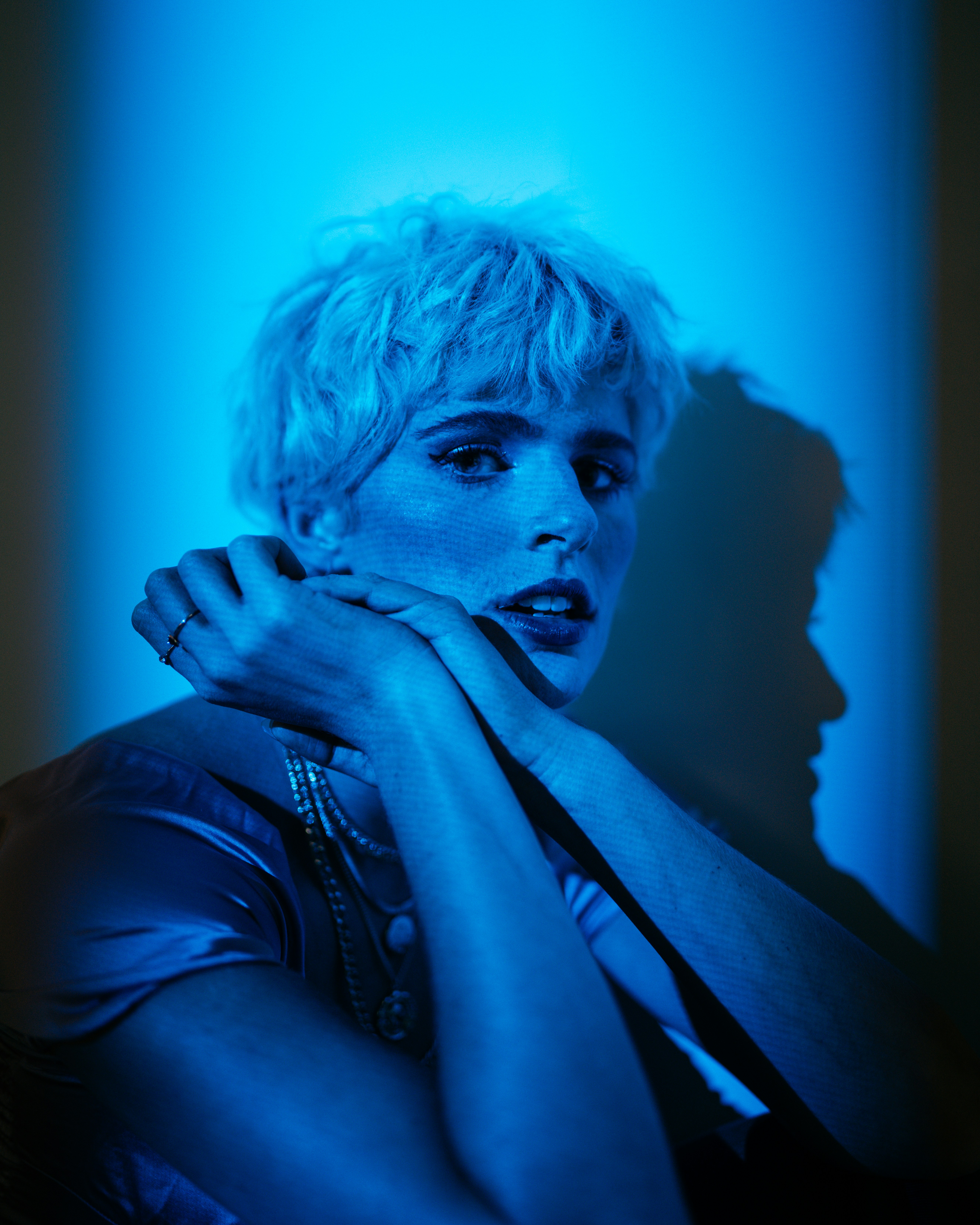 Blue Hour Intimacy: Portrait Cast in Neon Shadow