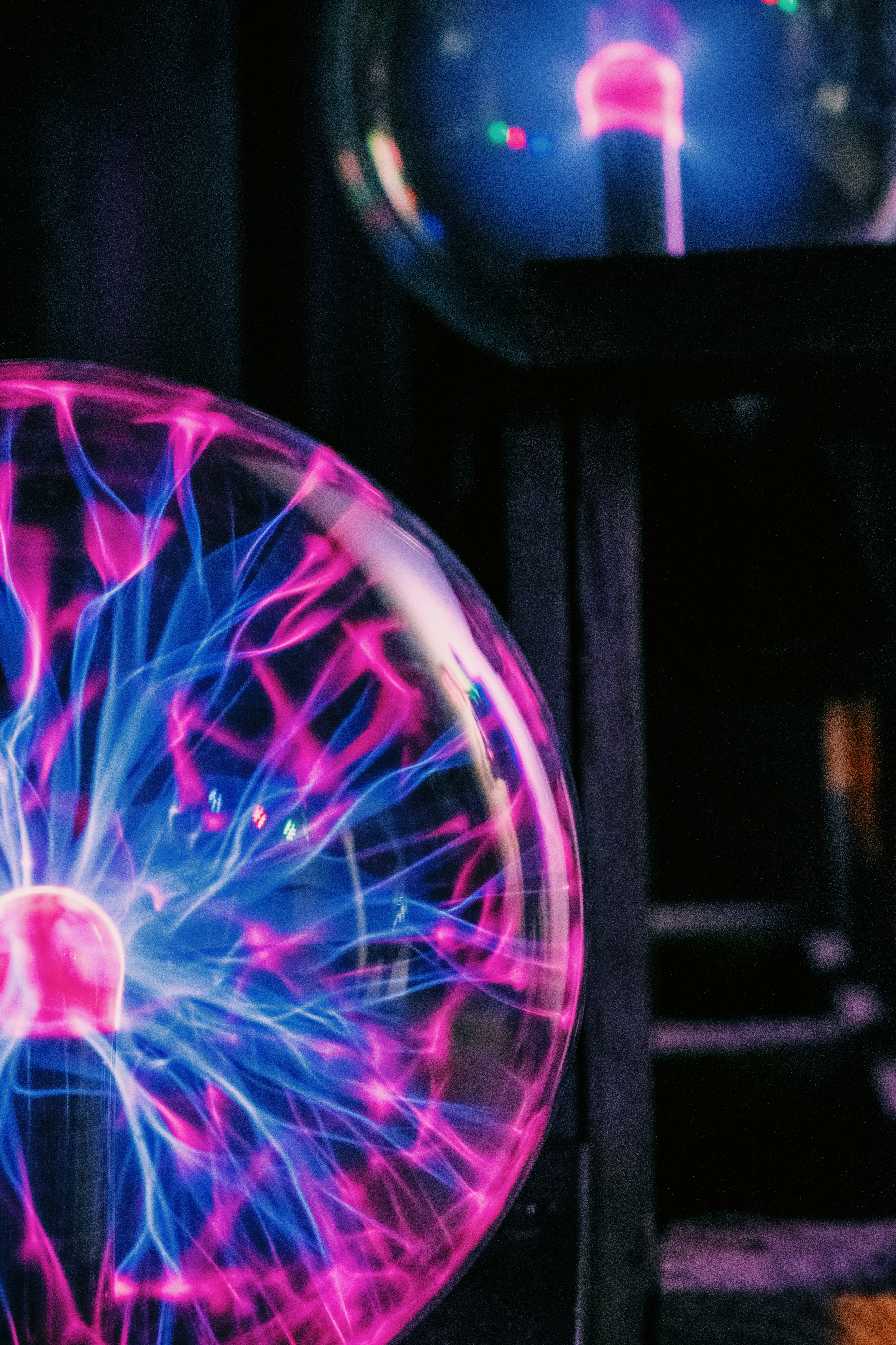 Electric Bloom: Neon Plasma in a Glass Orb
