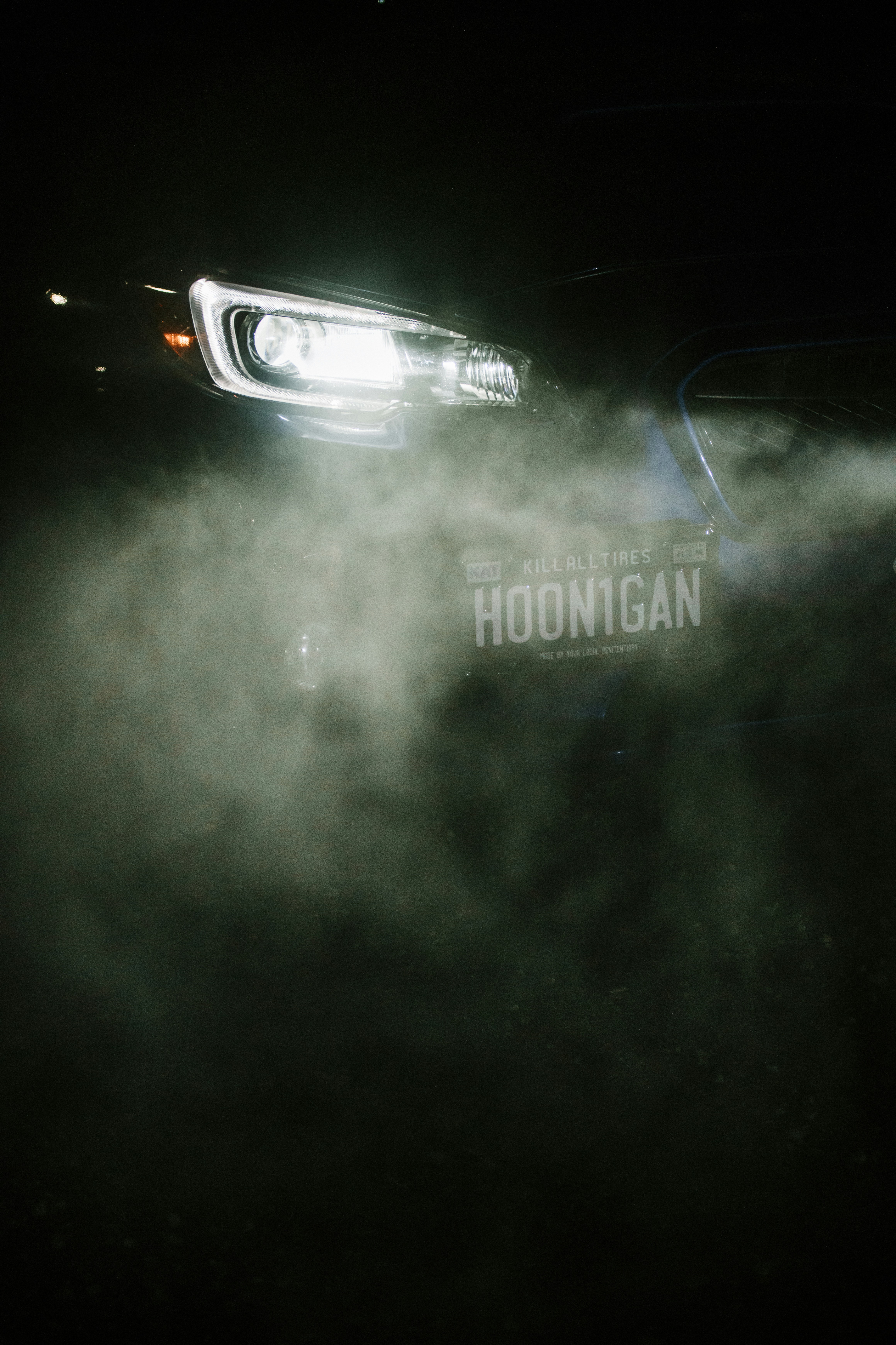 Night Stare: A Quiet Glimpse Through Steam and Headlights