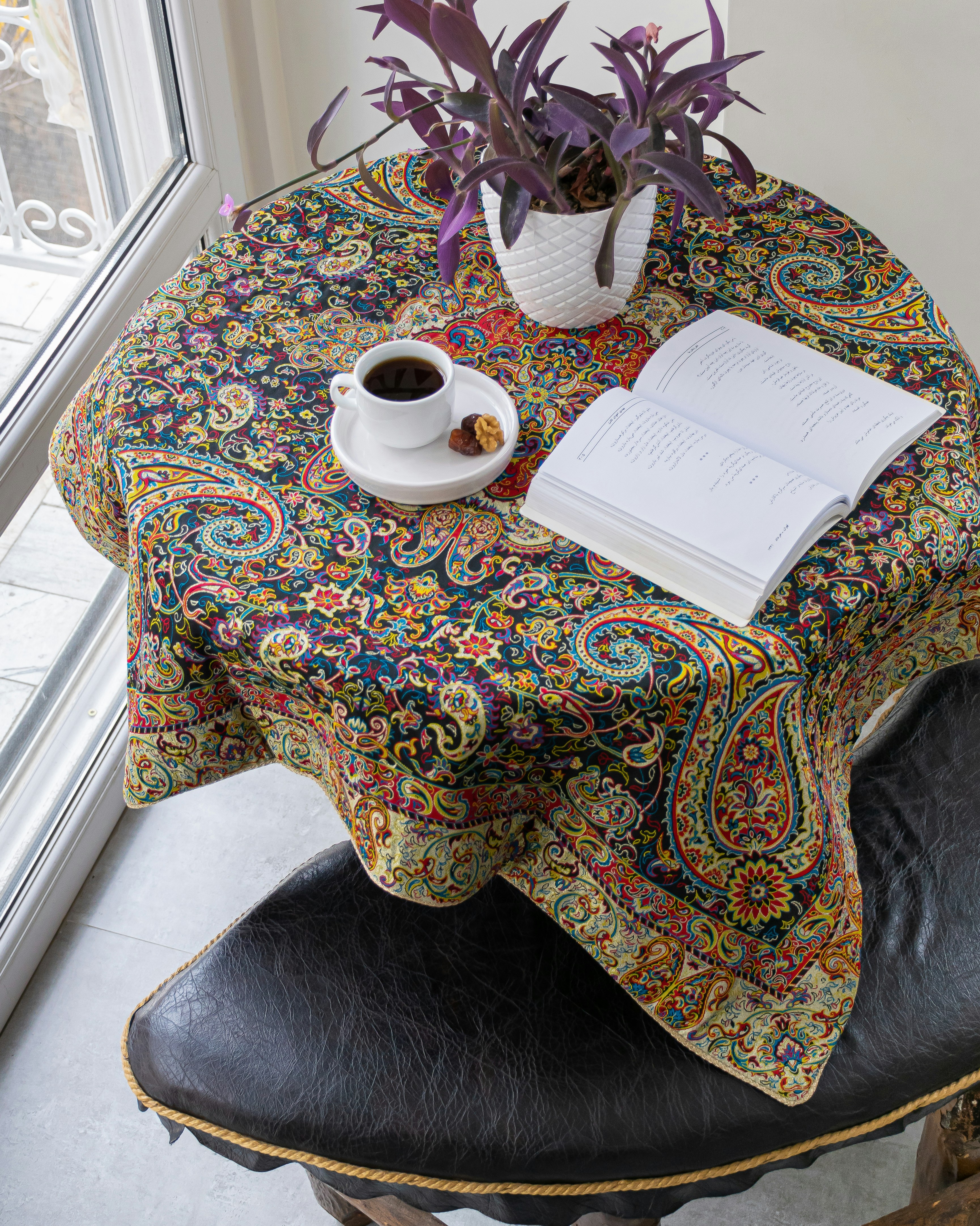 Paisley Tabletop: A Quiet Moment with Coffee, Book, and Purple Pothos