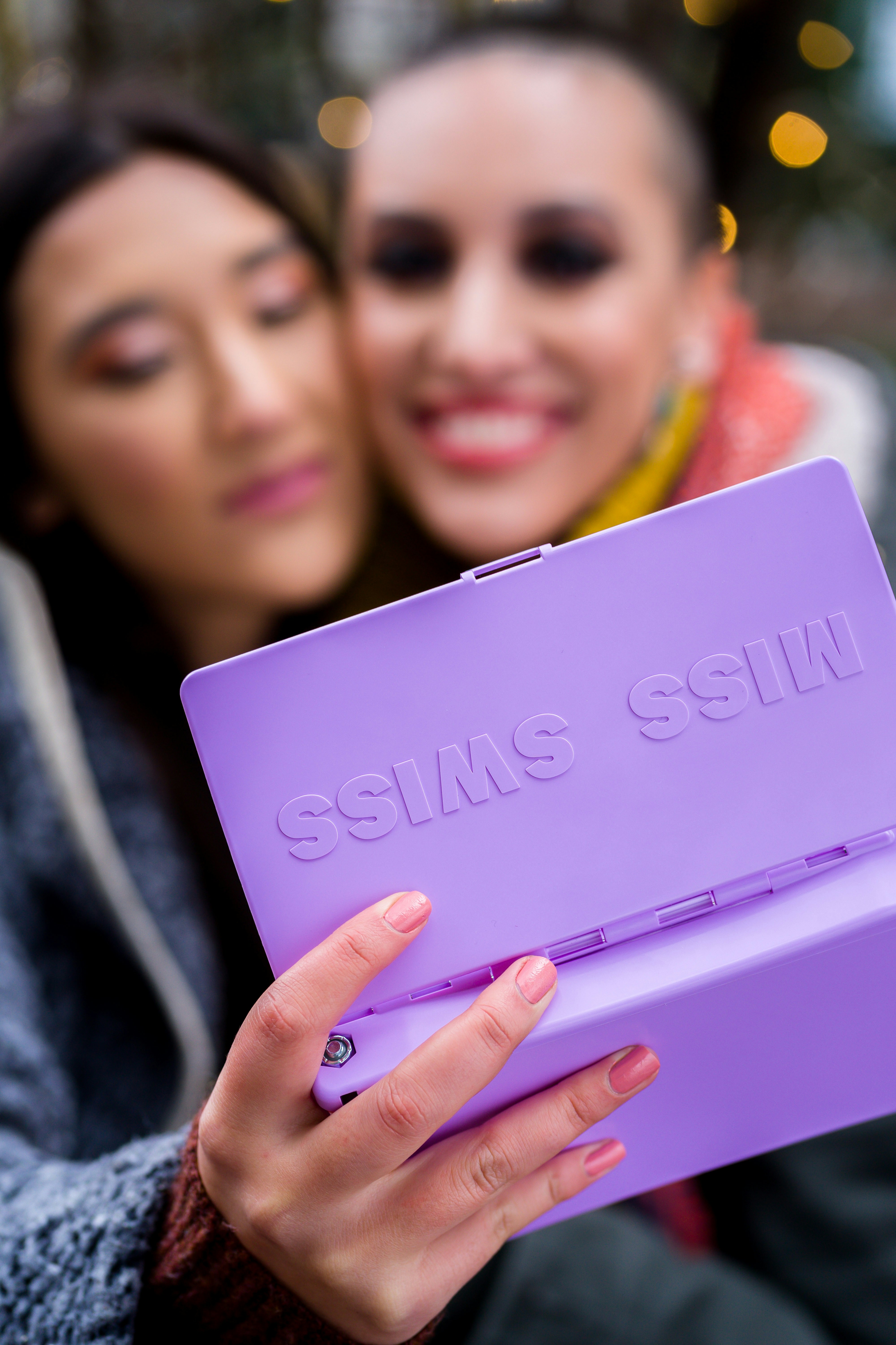 Lilac Selfie Capsule: Two Friends Framing Joy in Soft Bokeh