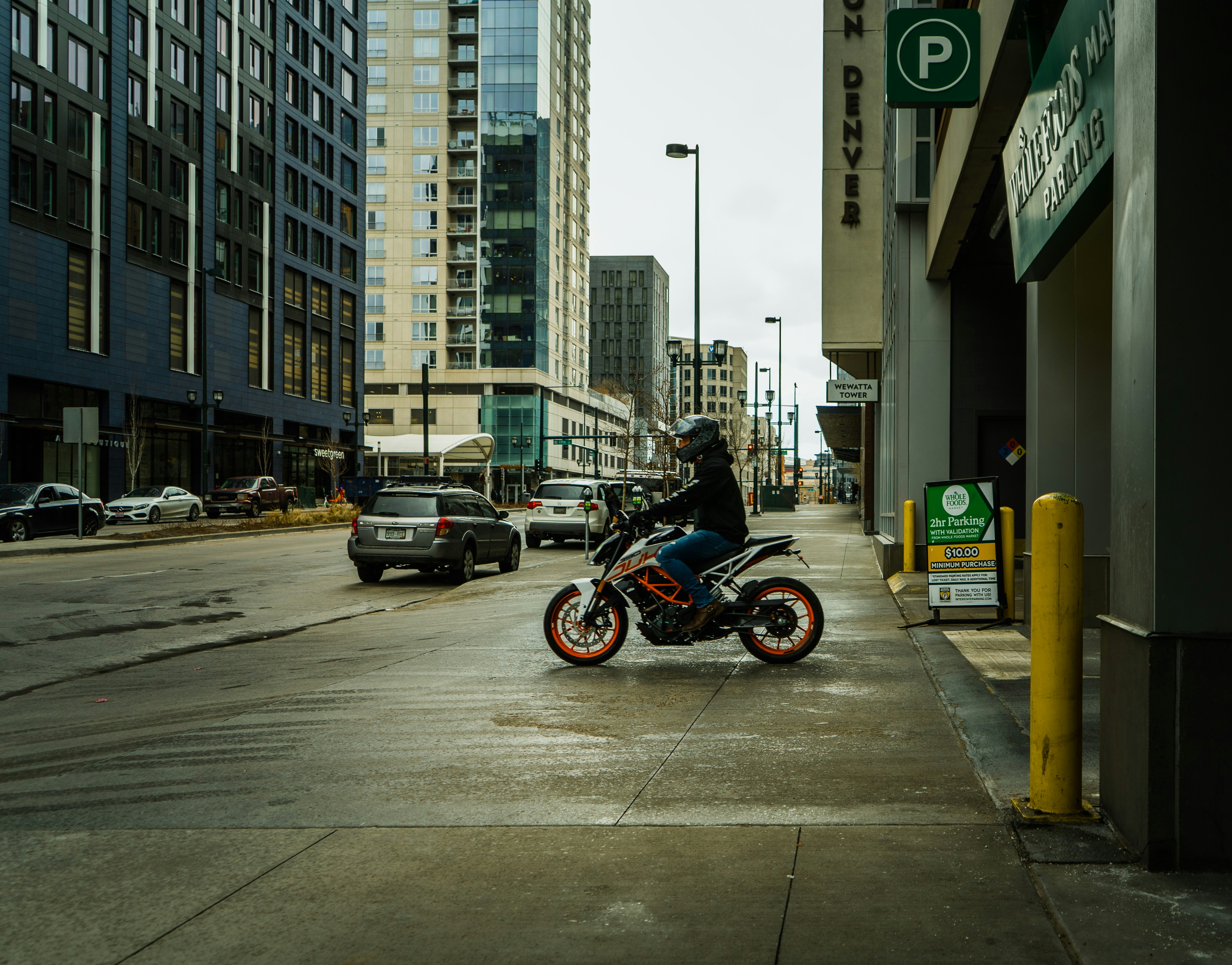 black and red motorcycle on road during daytime