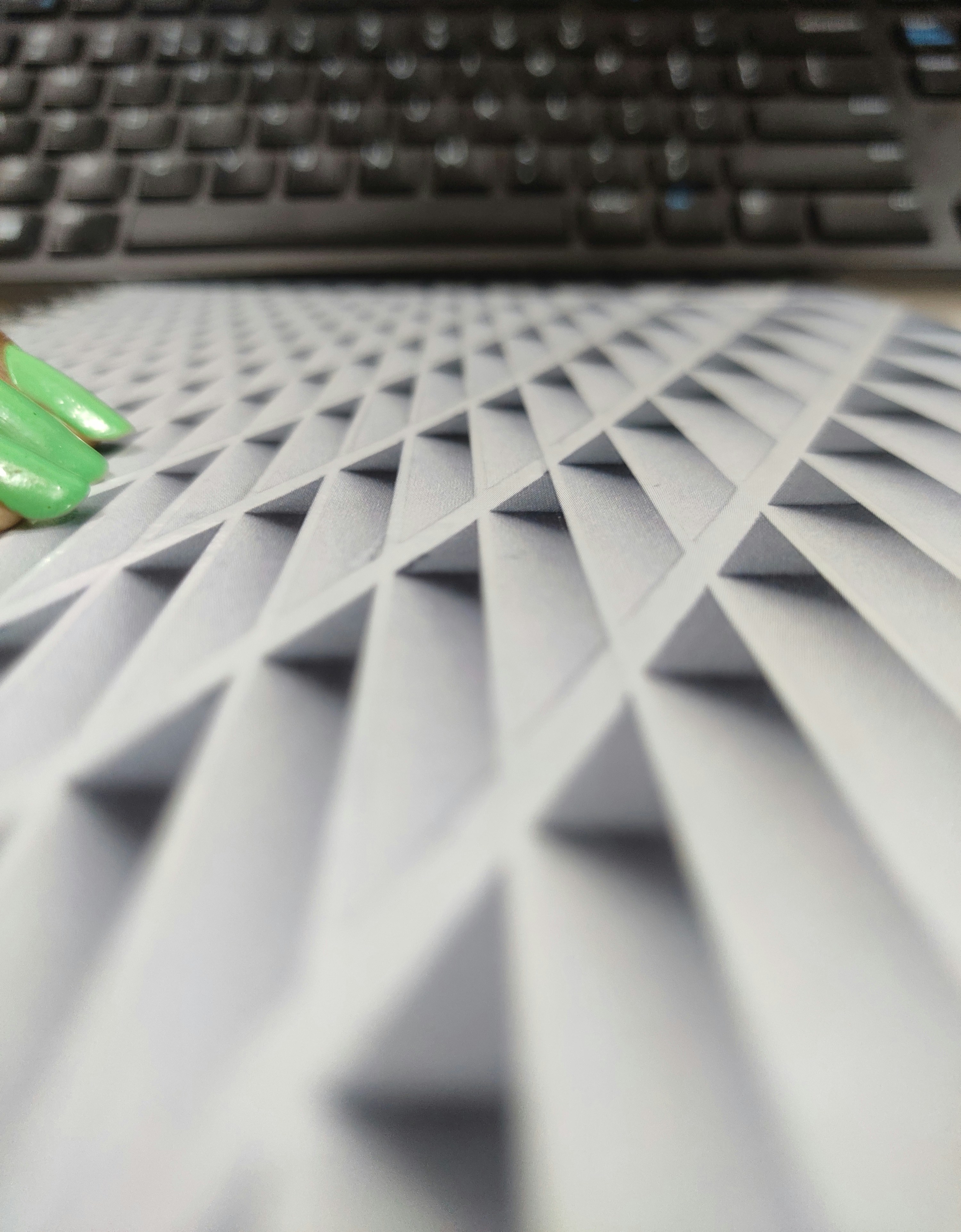 Pyramidal Field: a macro study of texture and light on a desk