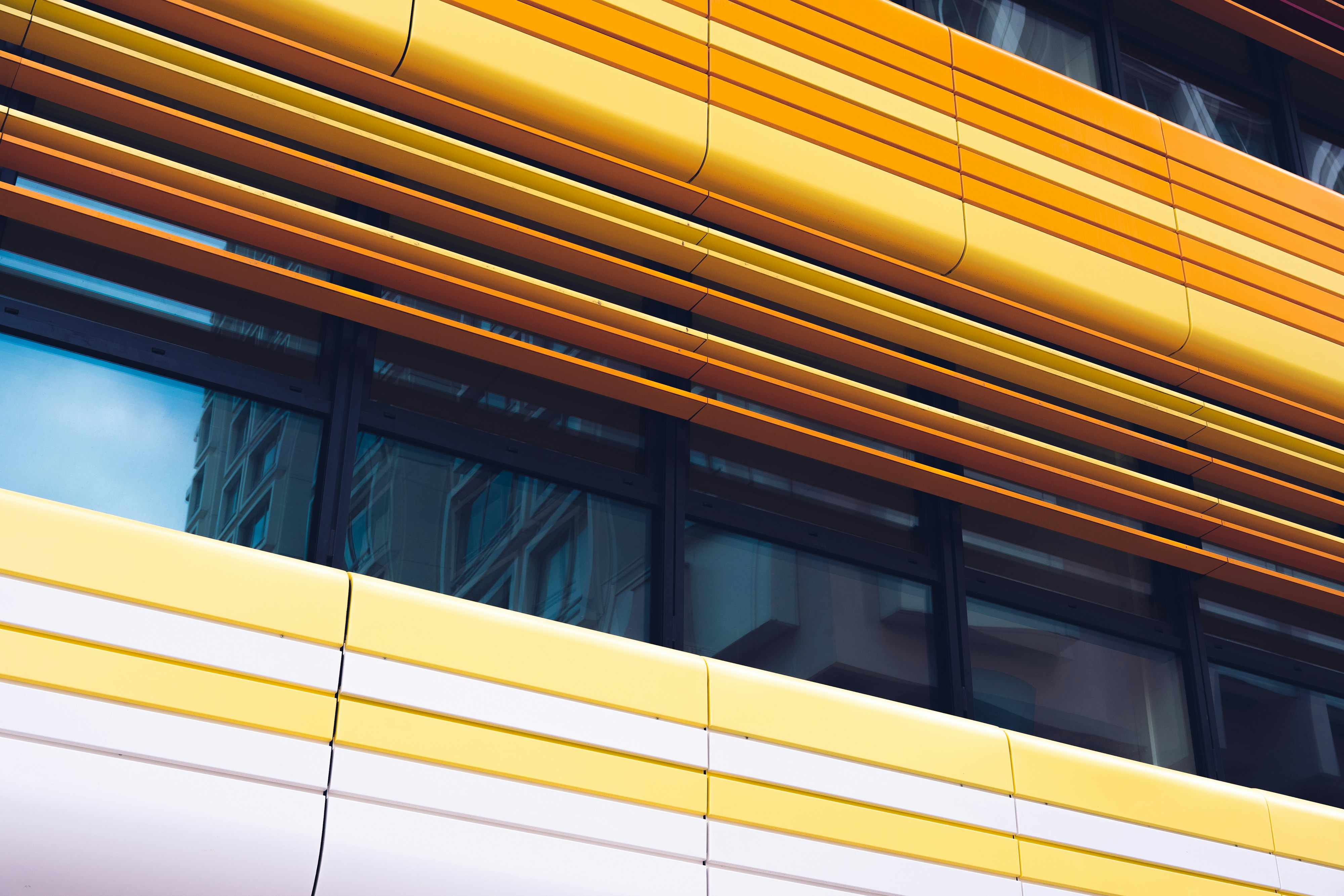 Yellow and blue glass window photo – Free Building Image on Unsplash