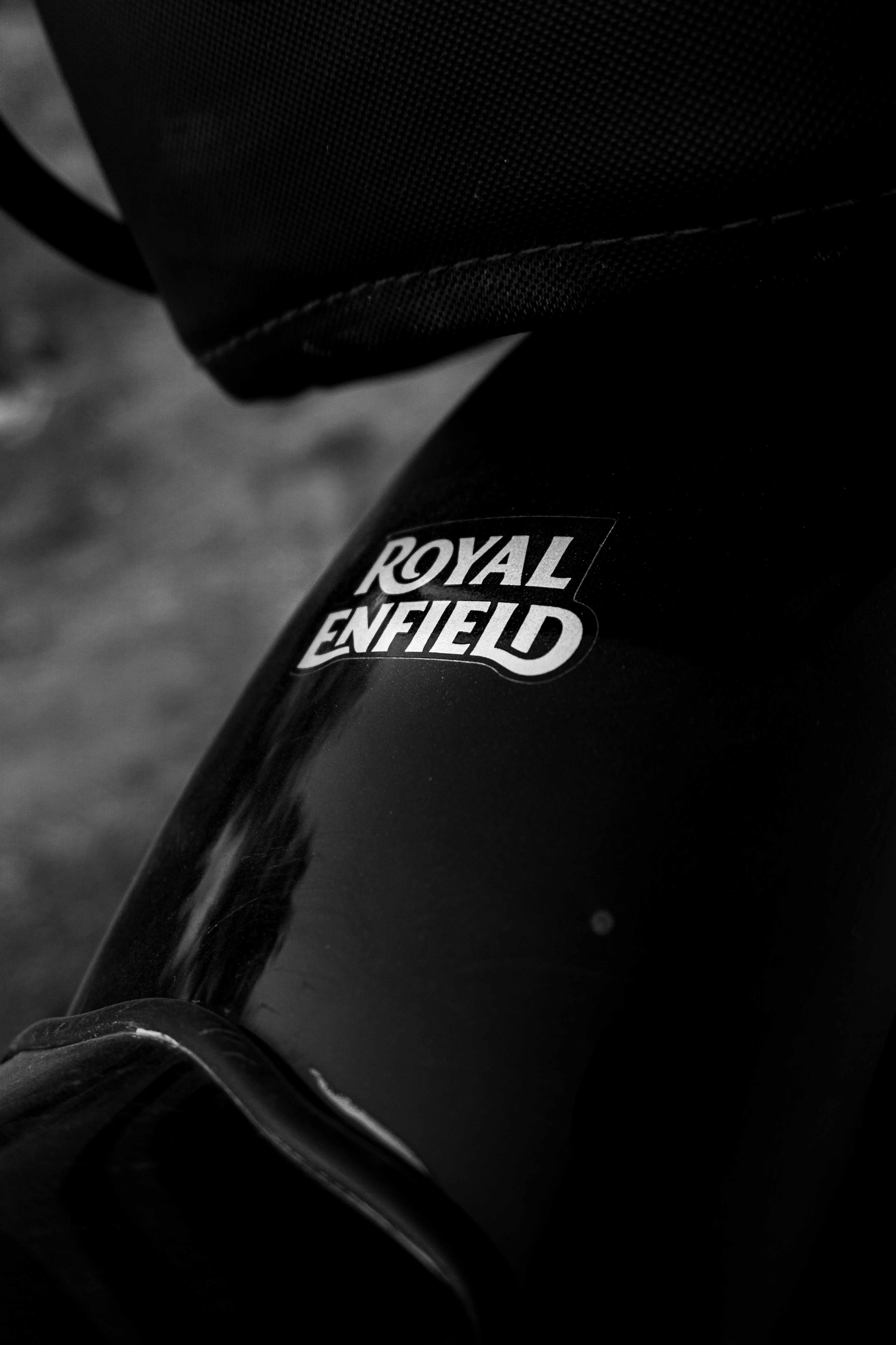 Monochrome Metalmark: Close-Up of Royal Enfield's Emblem