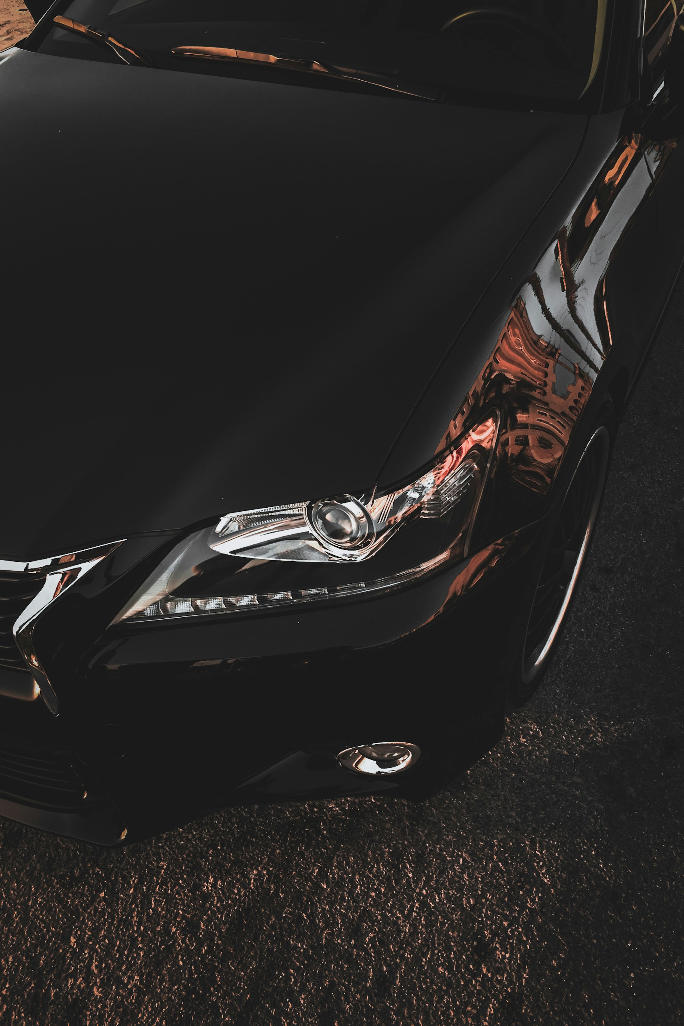 black porsche 911 in a dark room