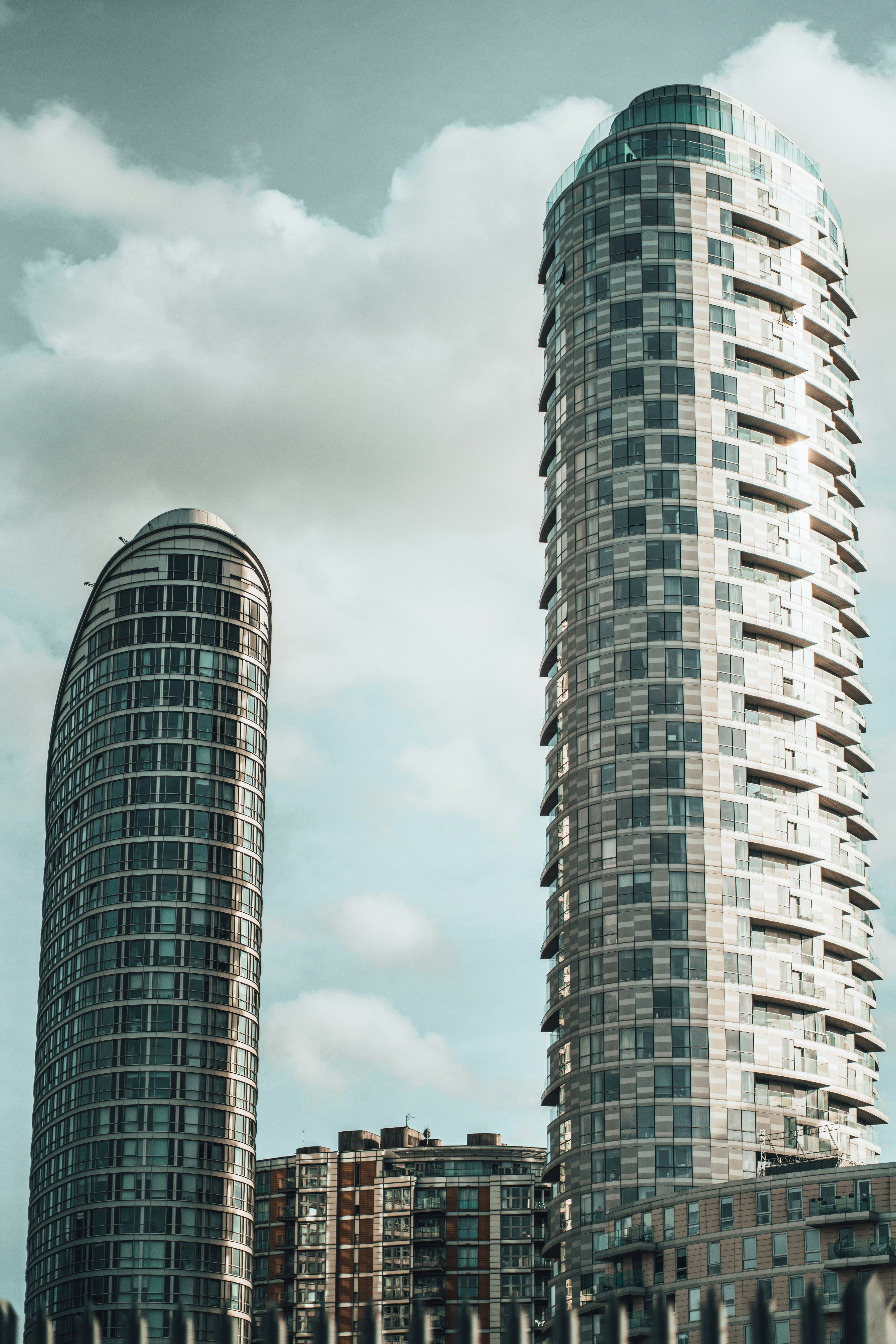 Gray concrete building under cloudy sky during daytime photo – Free ...