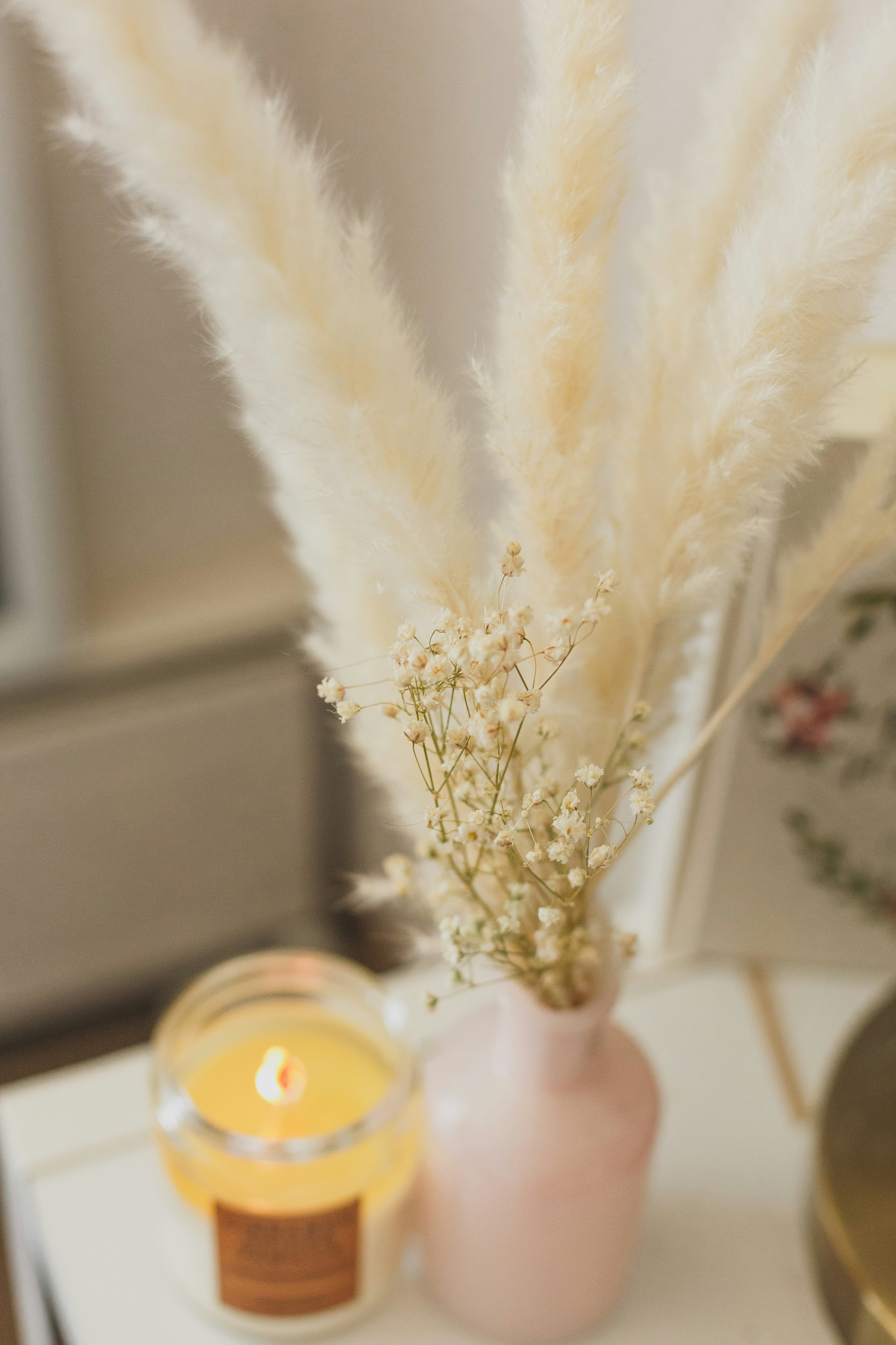 white flower in clear glass jar