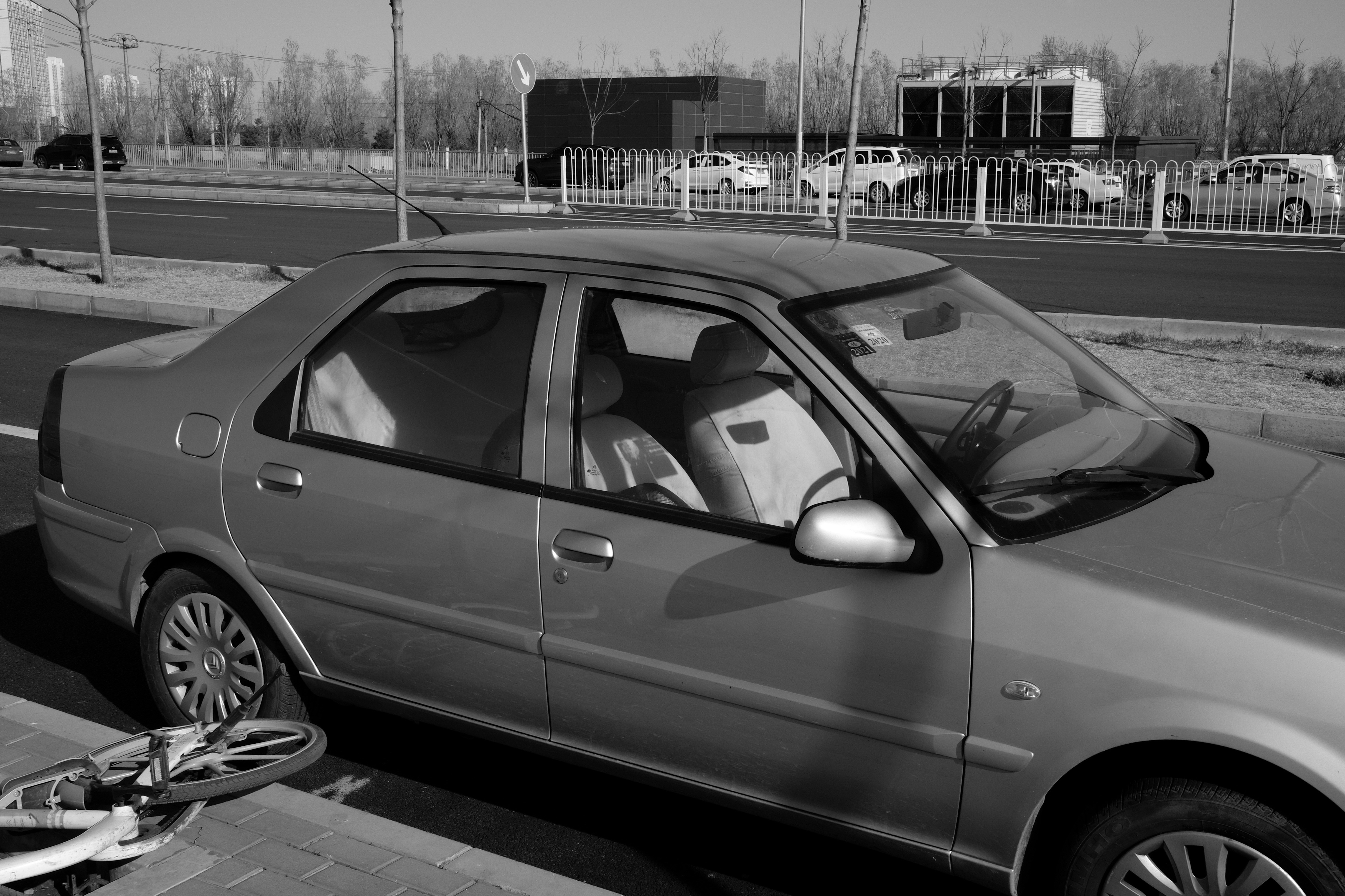 Grayscale photo of car on road photo – Free Car Image on Unsplash