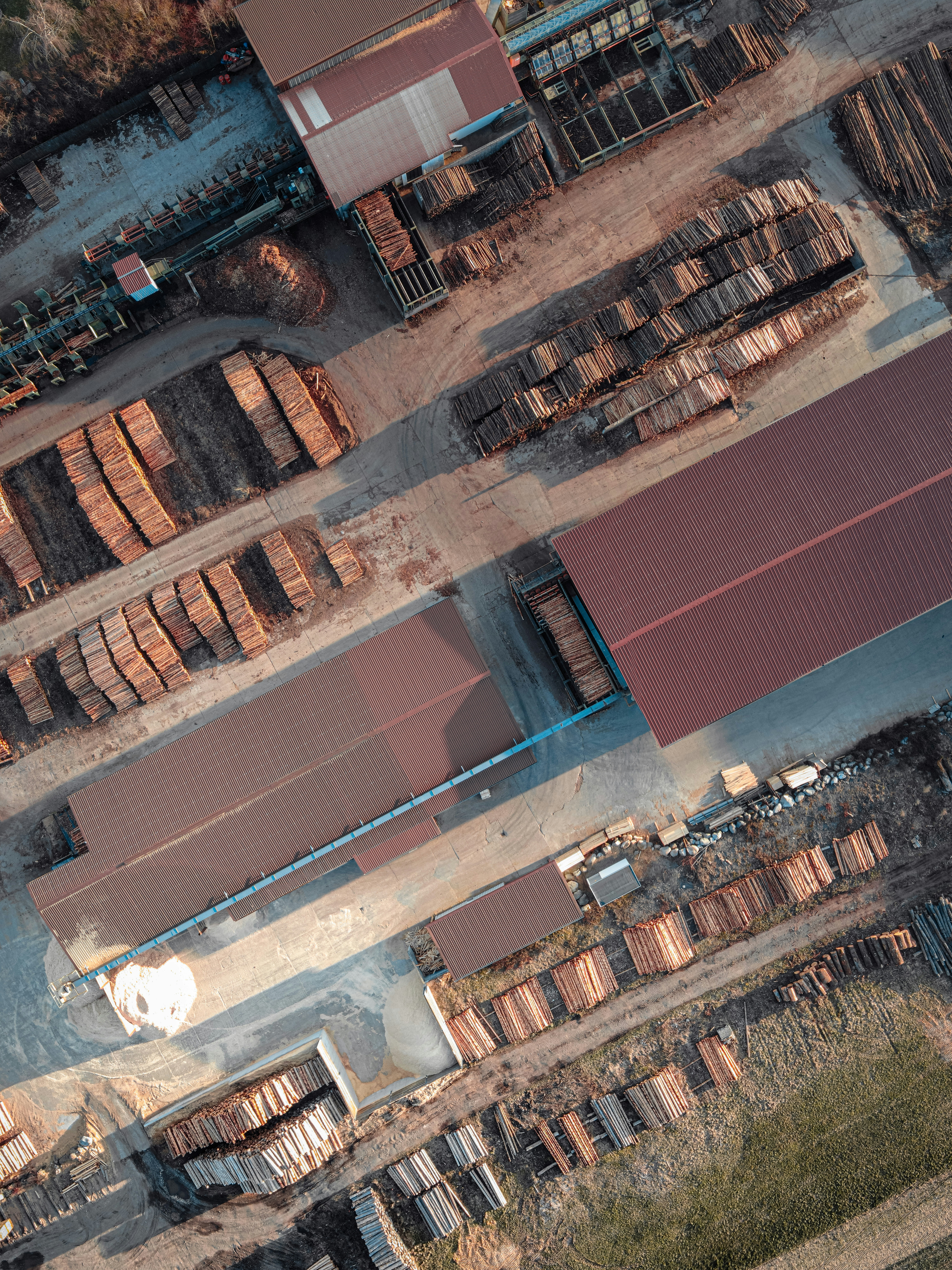 Timber Lattice: Aerial Study of a Lumber Yard
