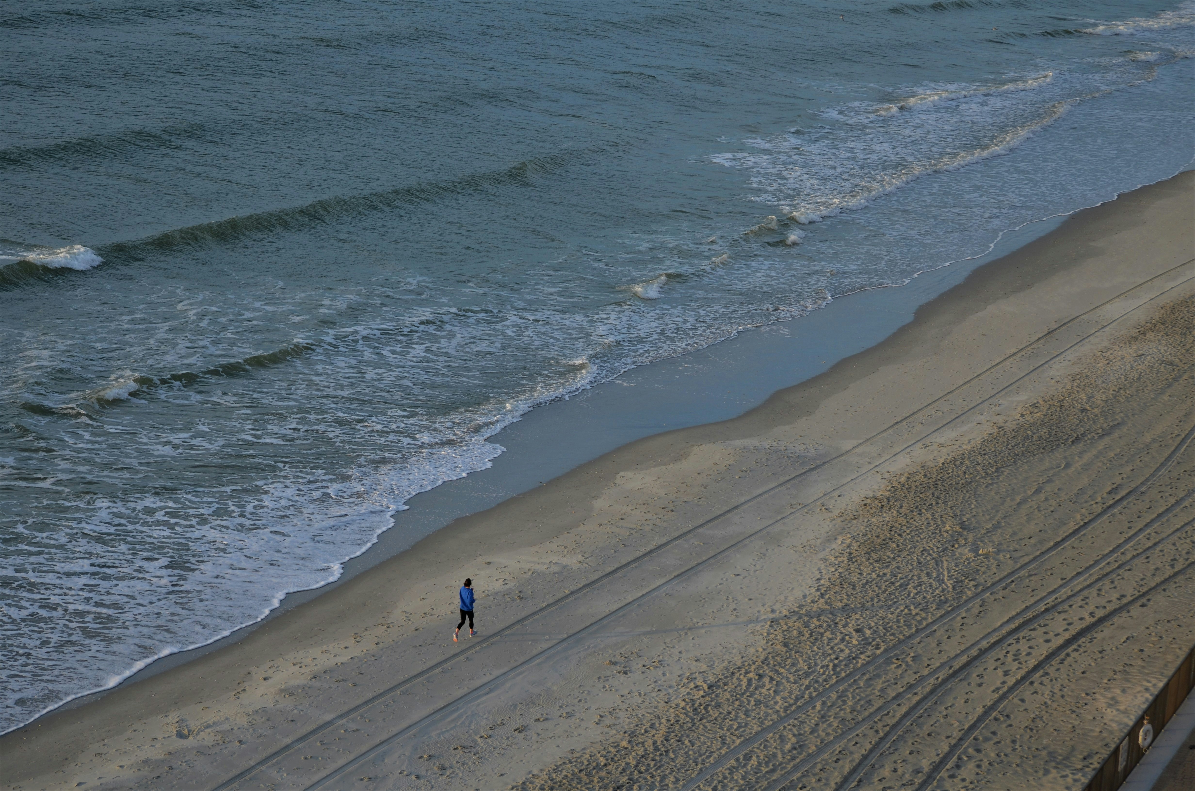 Early morning jog on the beach