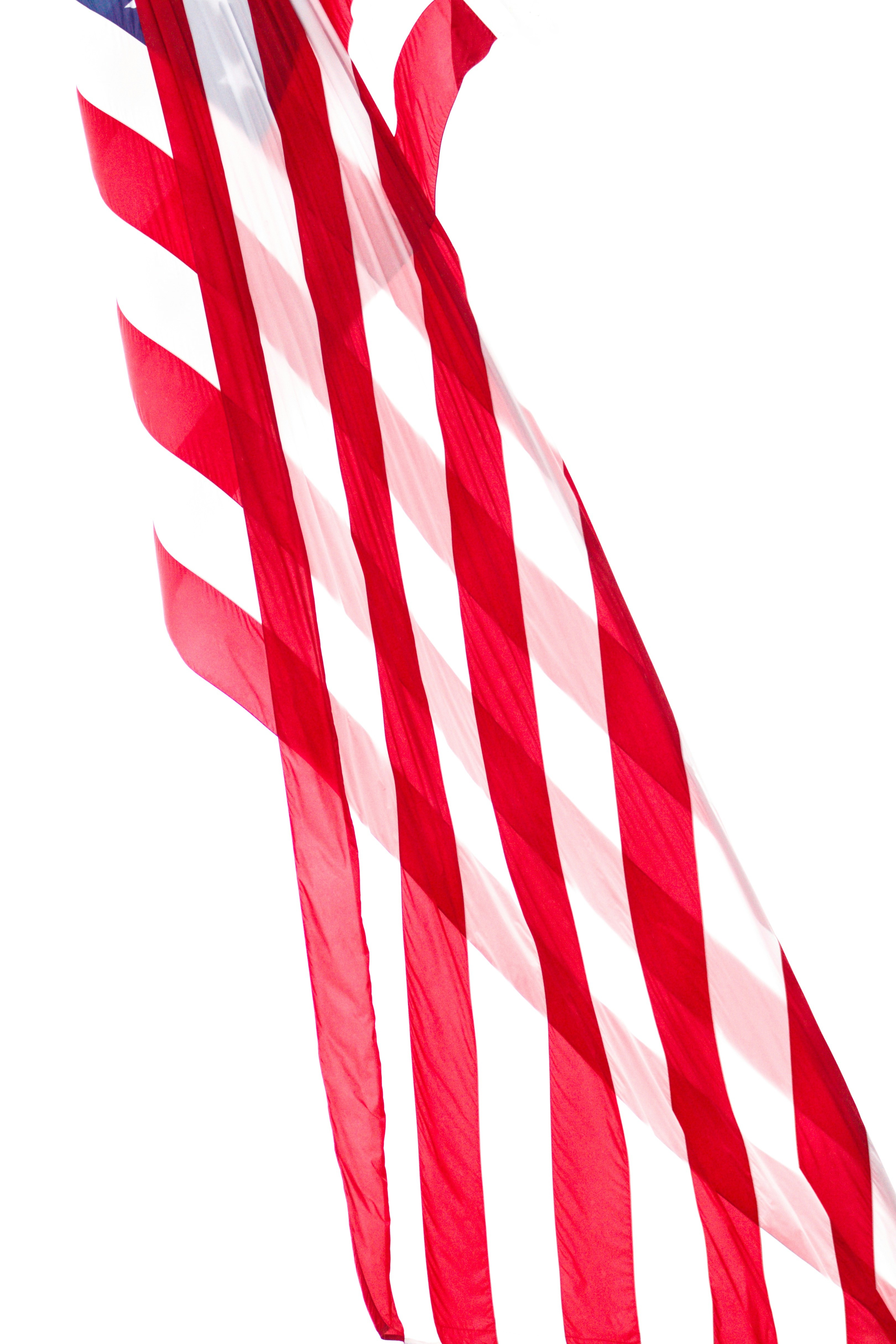 Red and white striped flag photo – Free American flag waving Image on ...