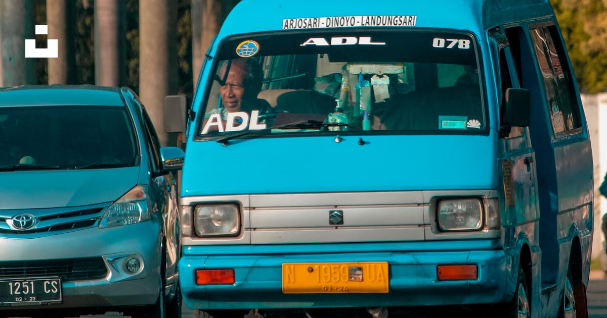 Blue And White Volkswagen Van On Road During Daytime Photo Free Bus
