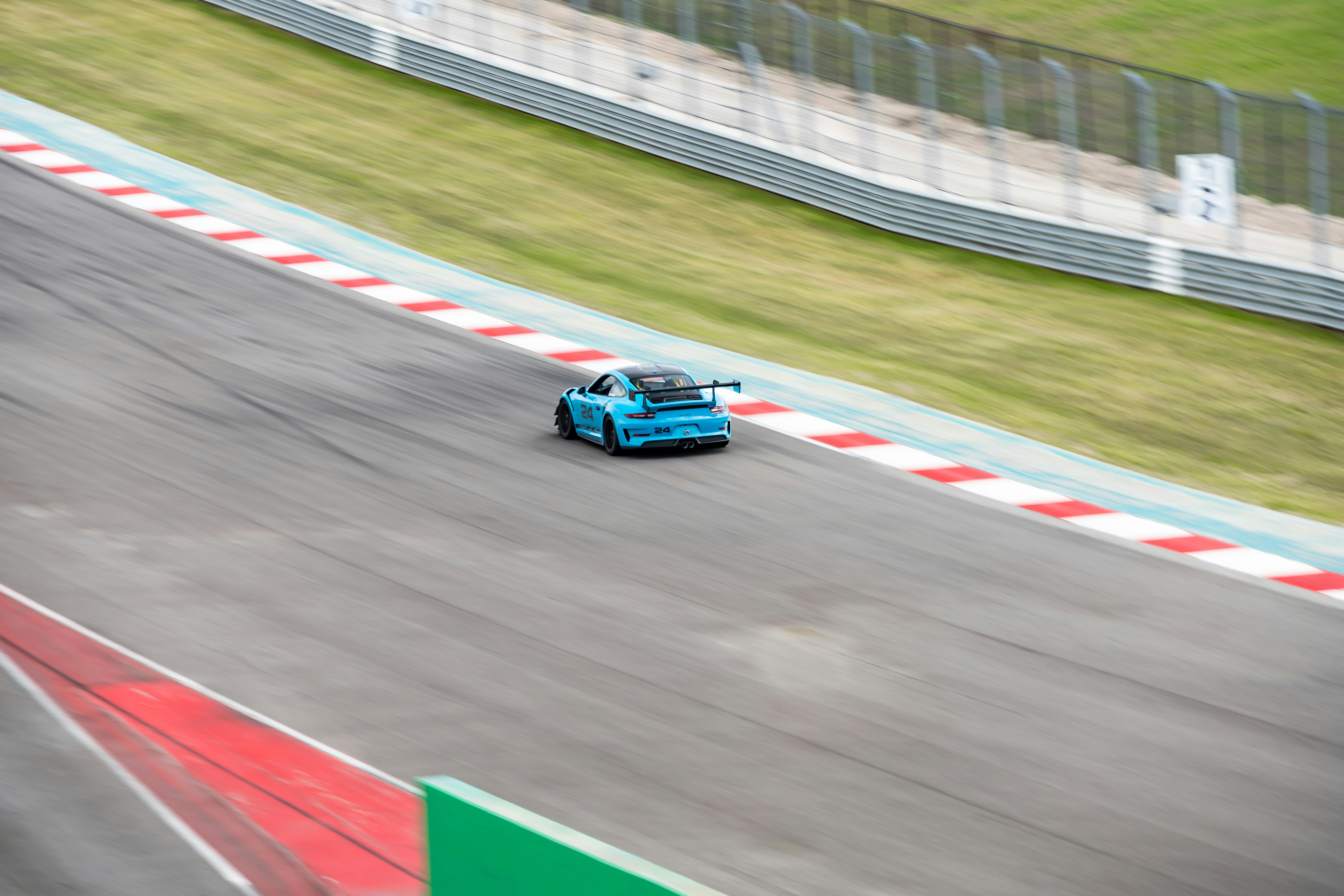 Blue and white racing car on track field during daytime photo – Free Tx ...