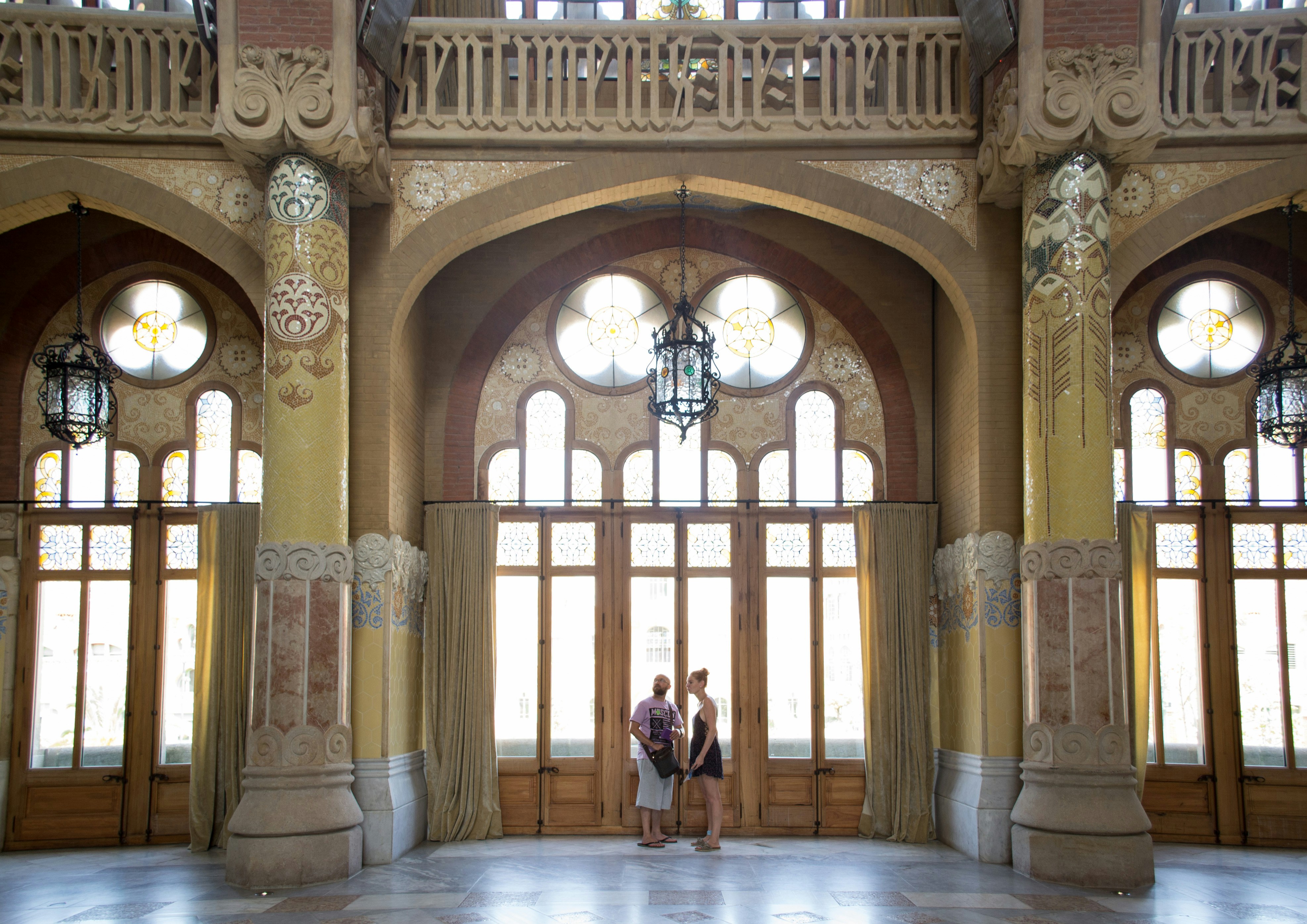People walking on hallway during daytime photo – Free Barcelona Image ...