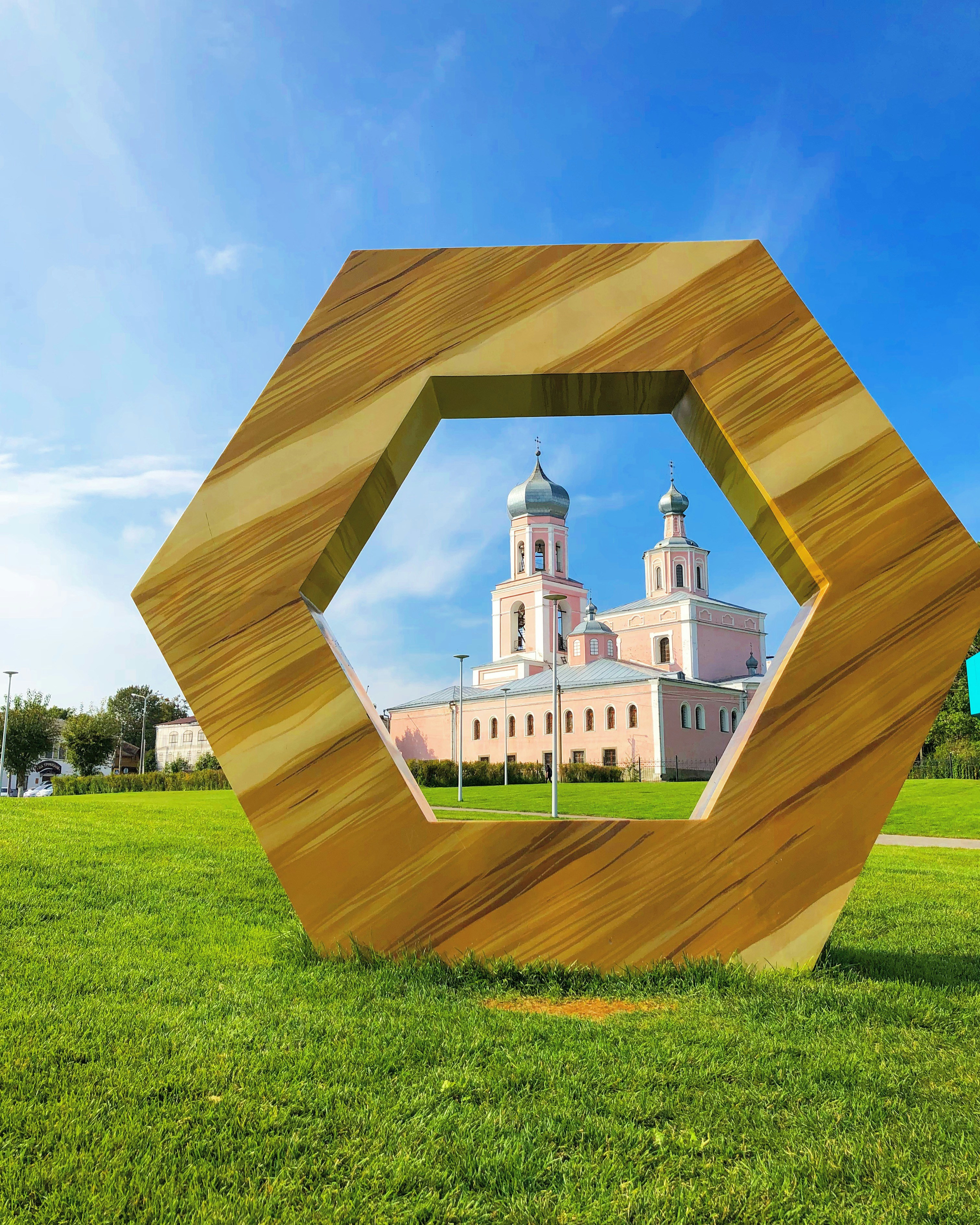 Hexagonal Portal: Framing a Pastel Church Through Timber Geometry