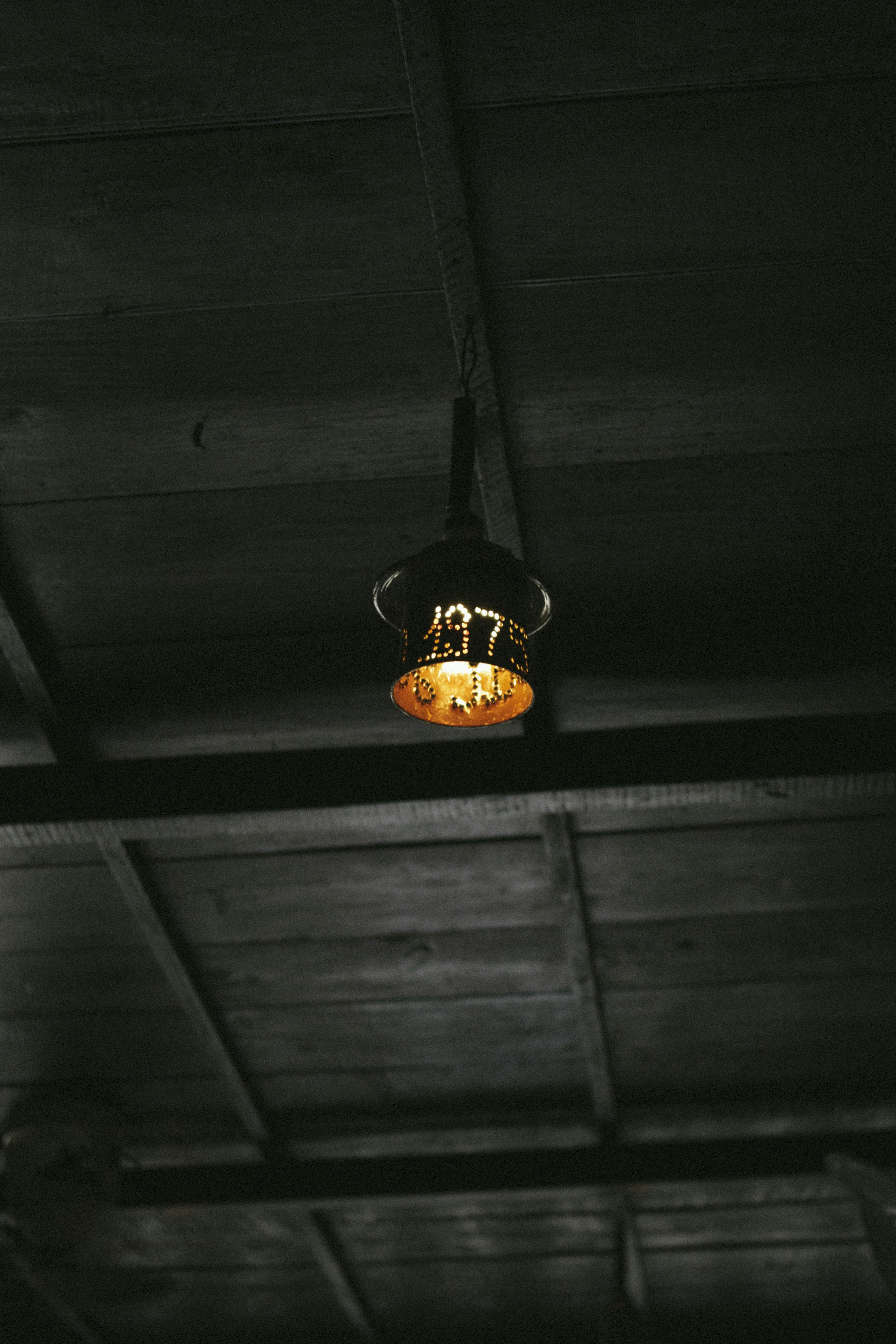 orange and black pendant lamp