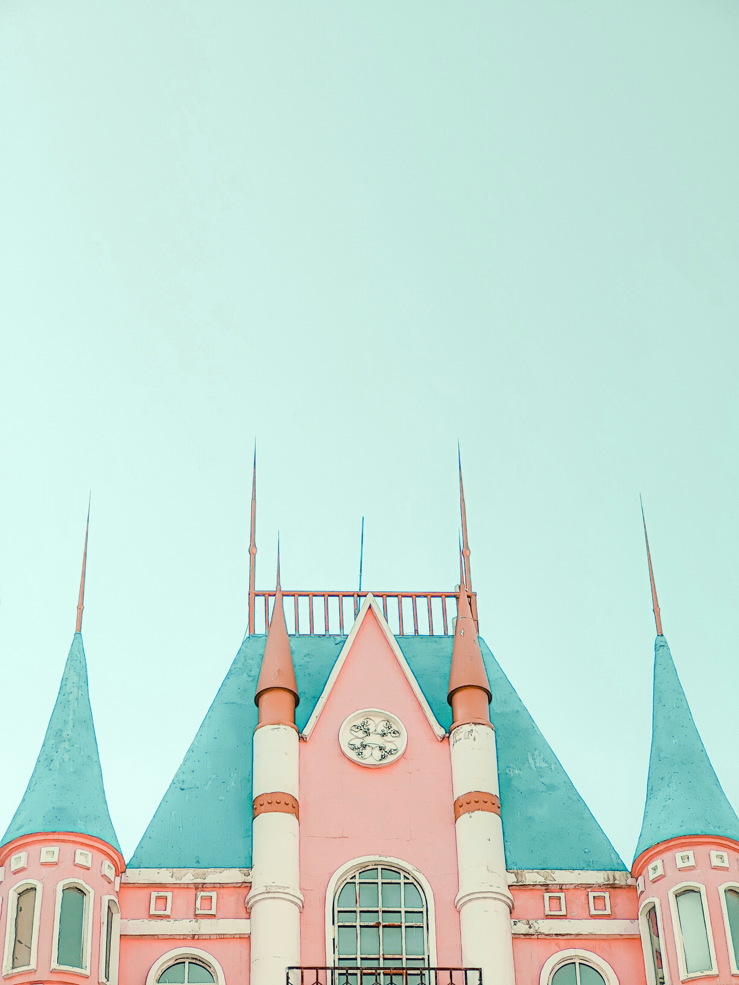Symmetrical Pastel Fortress Under a Mint Sky