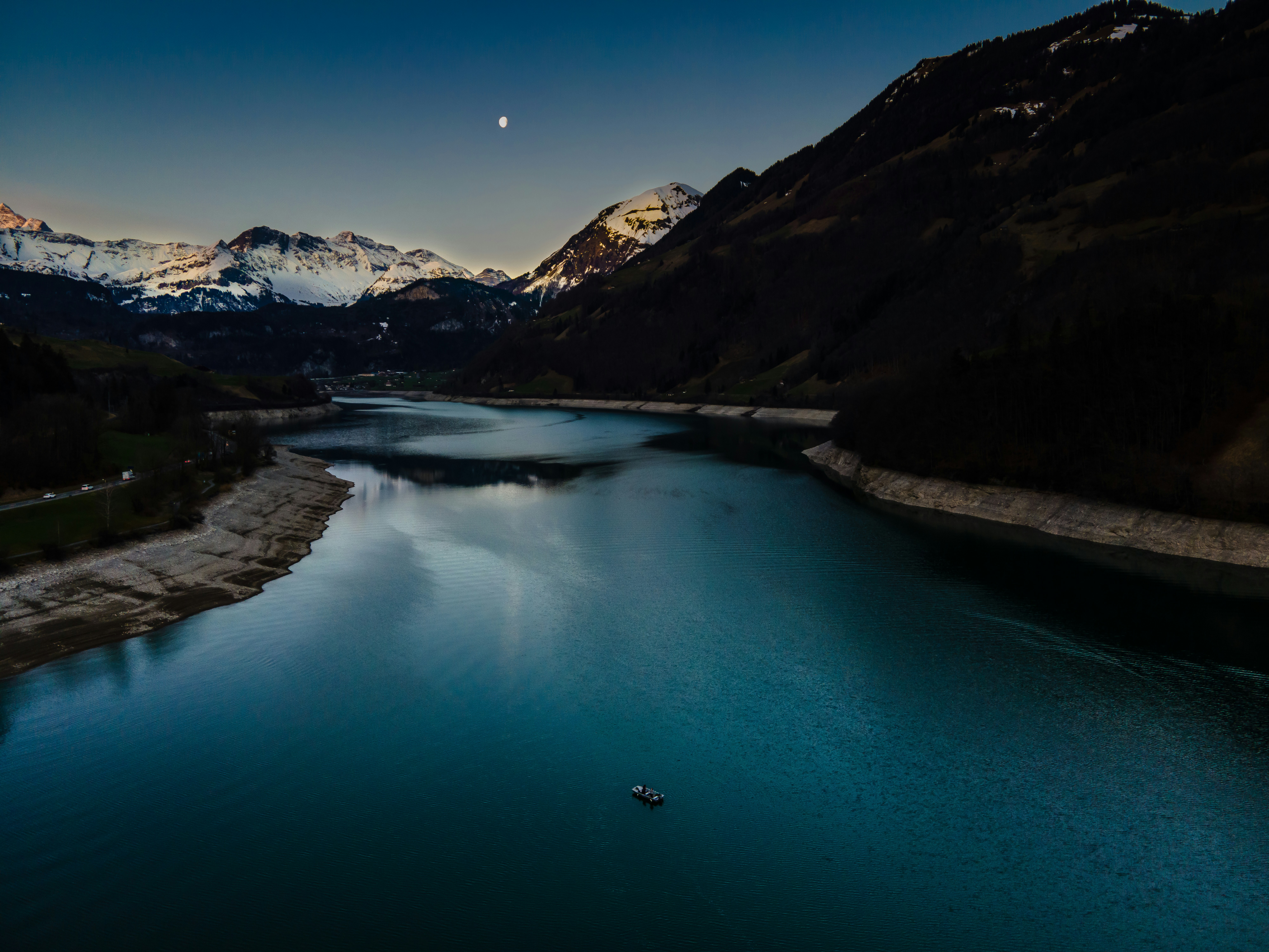Moonlit River Between Snow-Frosted Peaks