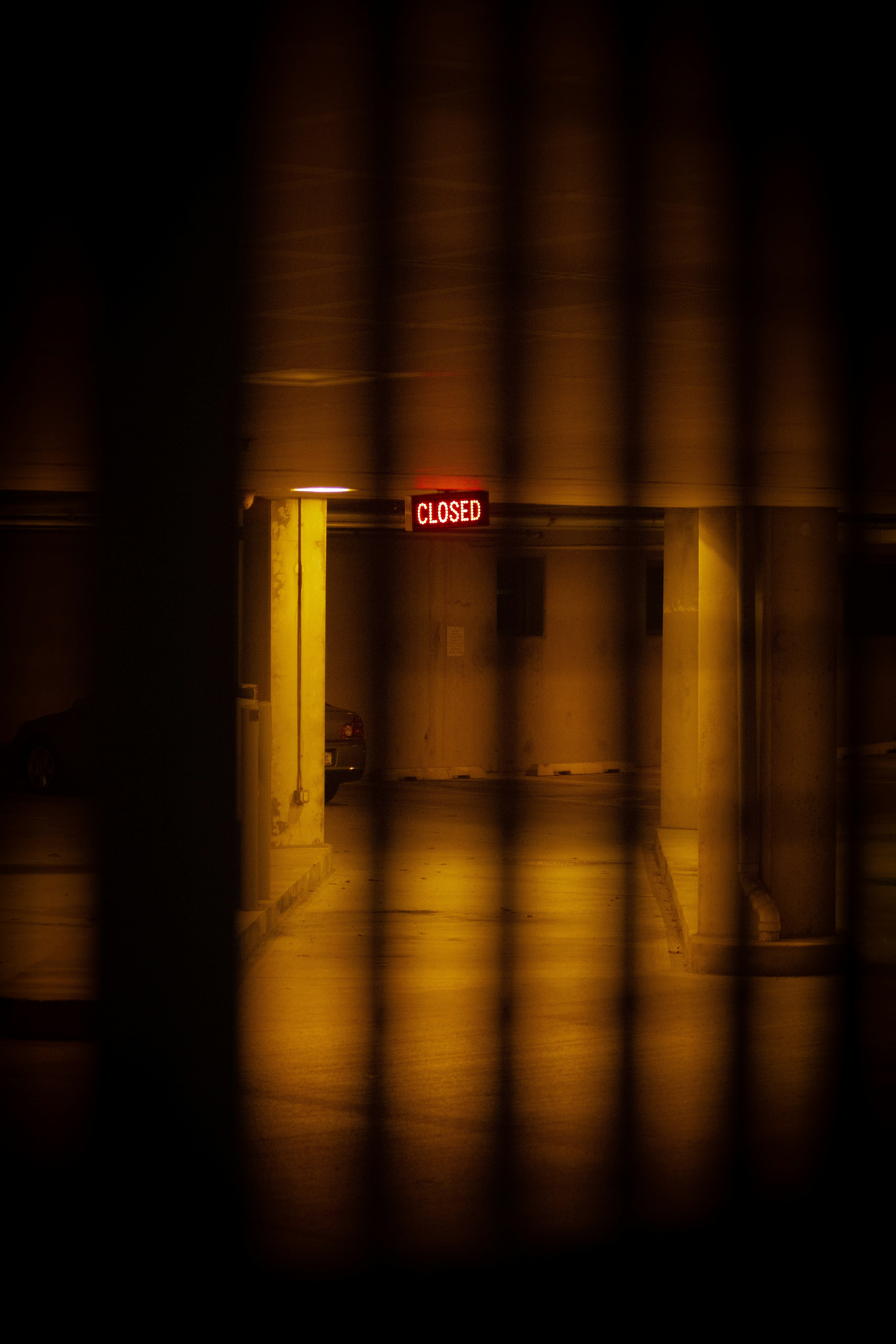 Behind the Bars: A Quiet Nocturne in an Empty Parking Structure