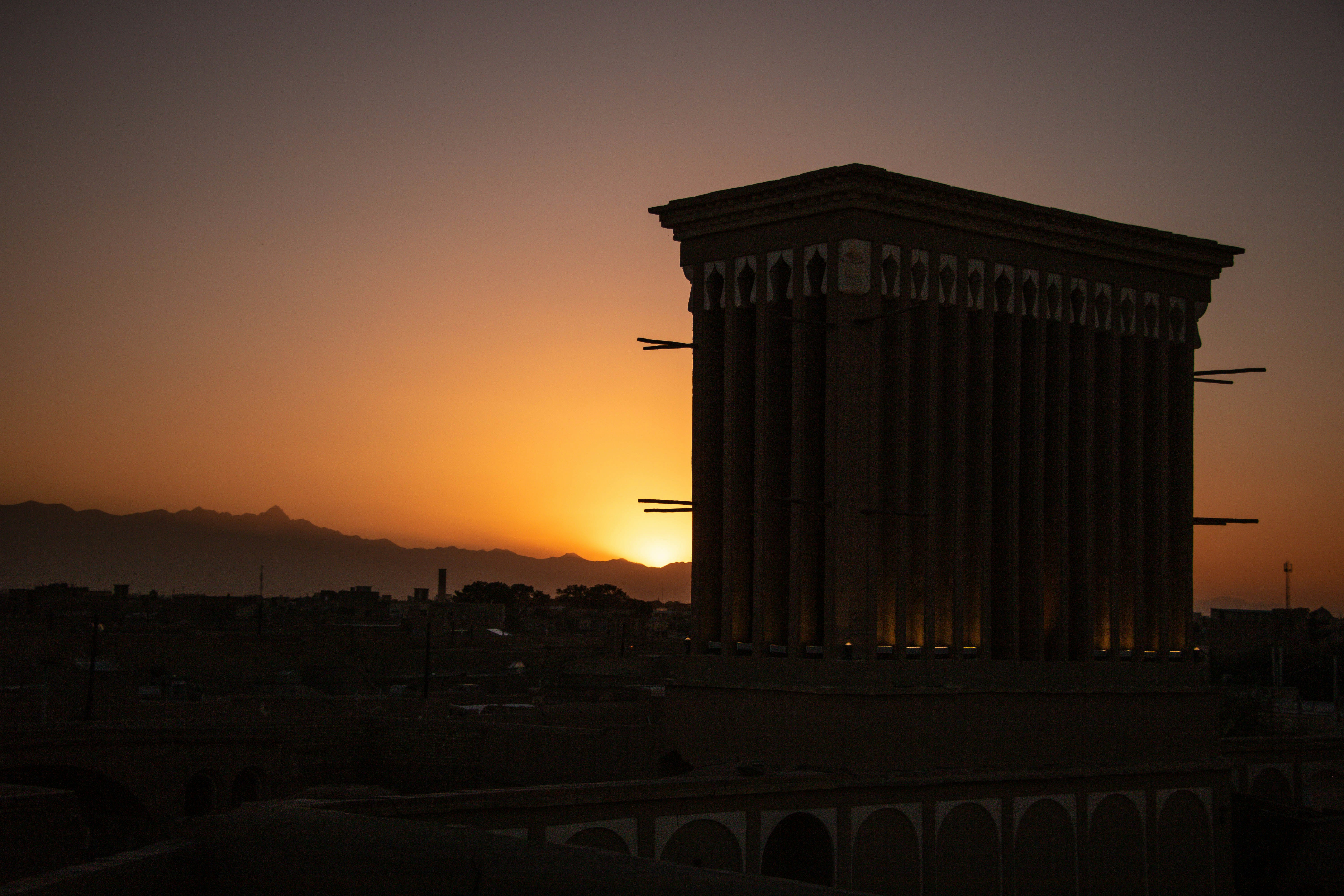 Silhouette of Ancient Windcatcher at Dusk