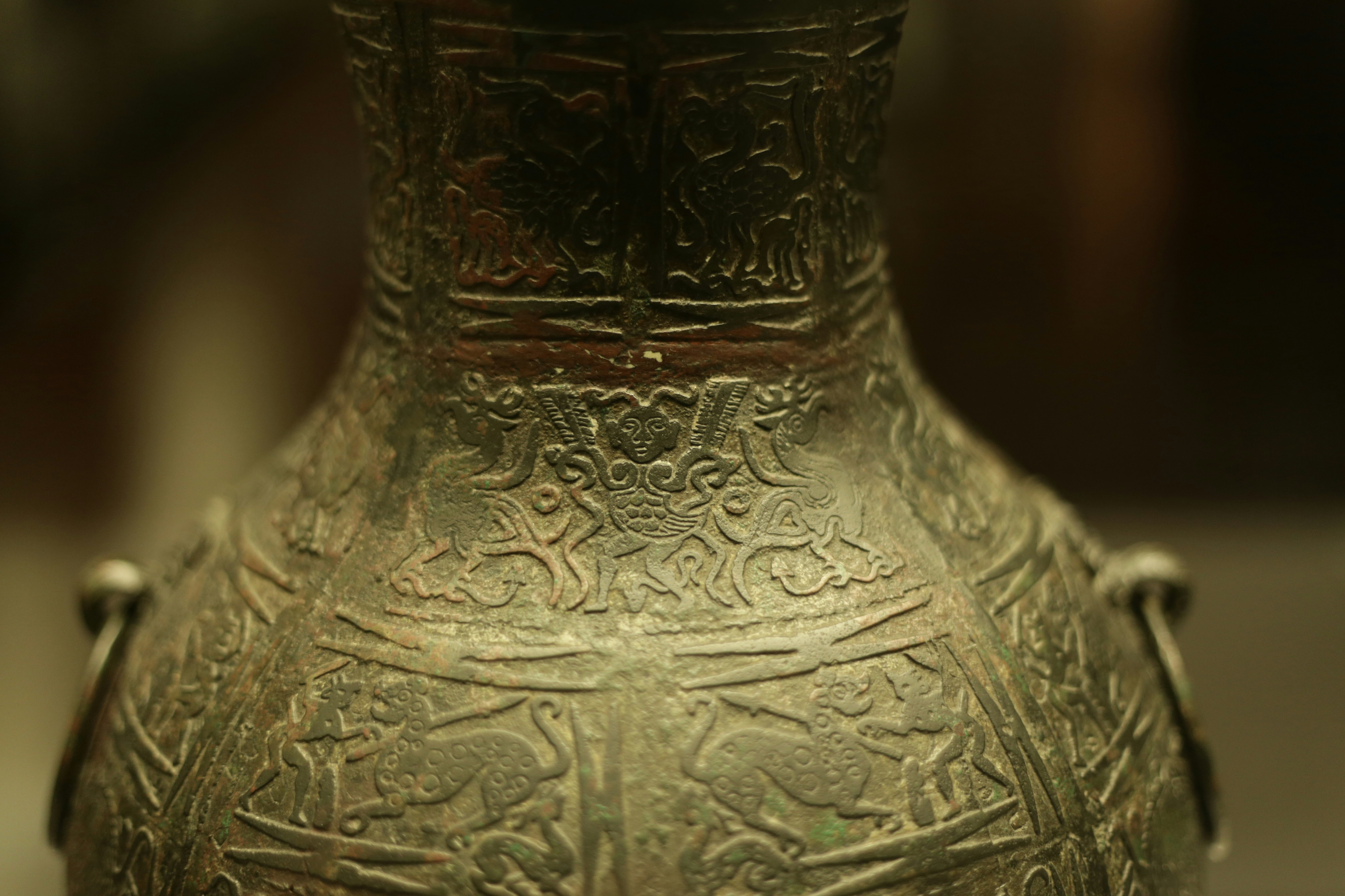 Bronze Neck in Focus: A Macro Portrait of Ornate Engravings
