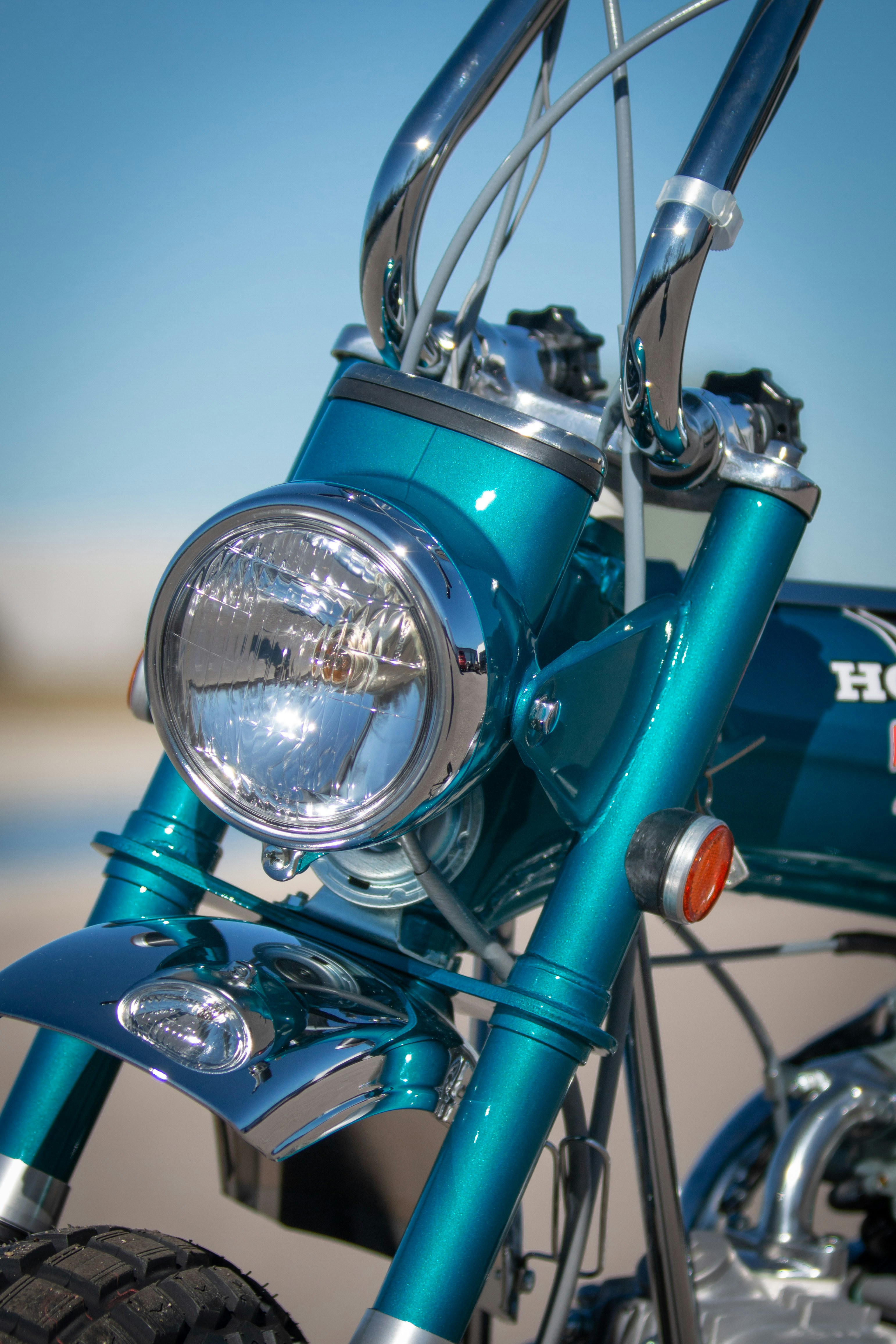 Blue and silver motorcycle with blue and white background photo – Free ...